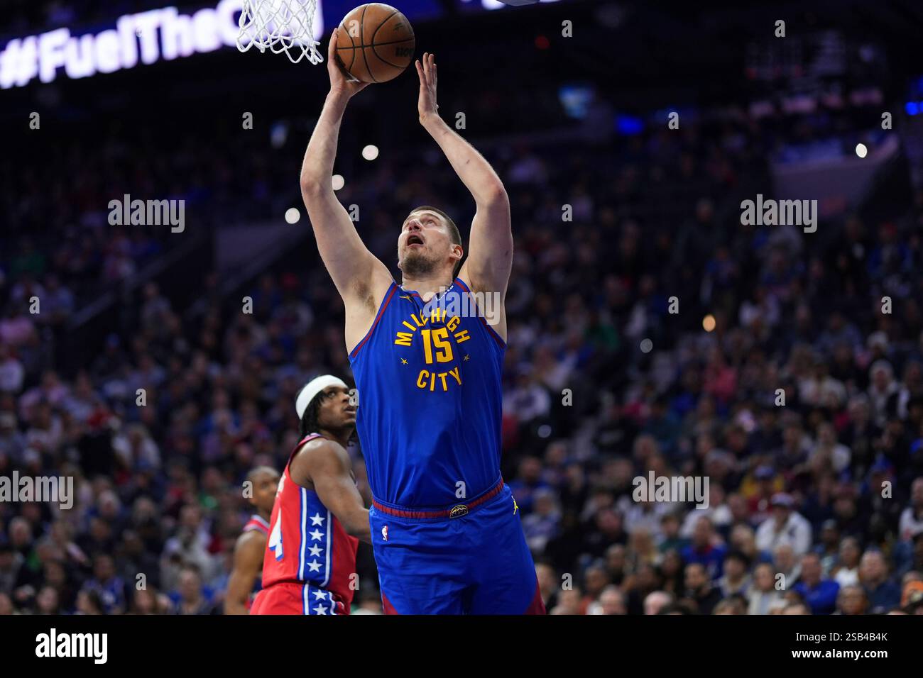 Denver Nuggets' Nikola Jokic goes up for a shot during the first half ...