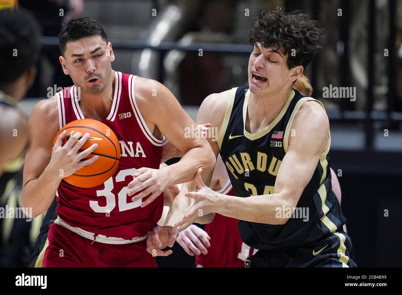Indiana guard Trey Galloway (32) grabs a rebound in front of Purdue ...