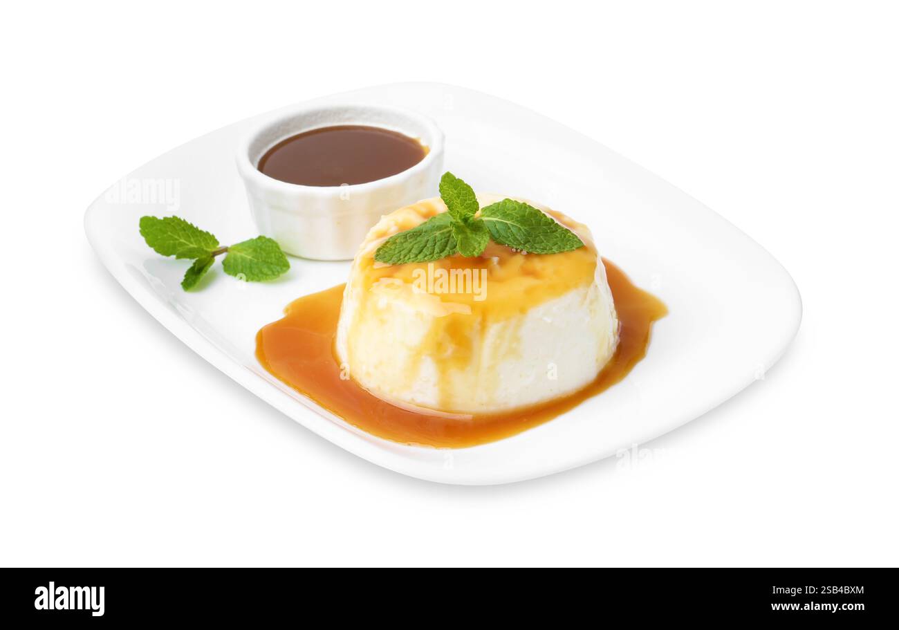 Tasty pudding with caramel sauce and mint isolated on white Stock Photo ...