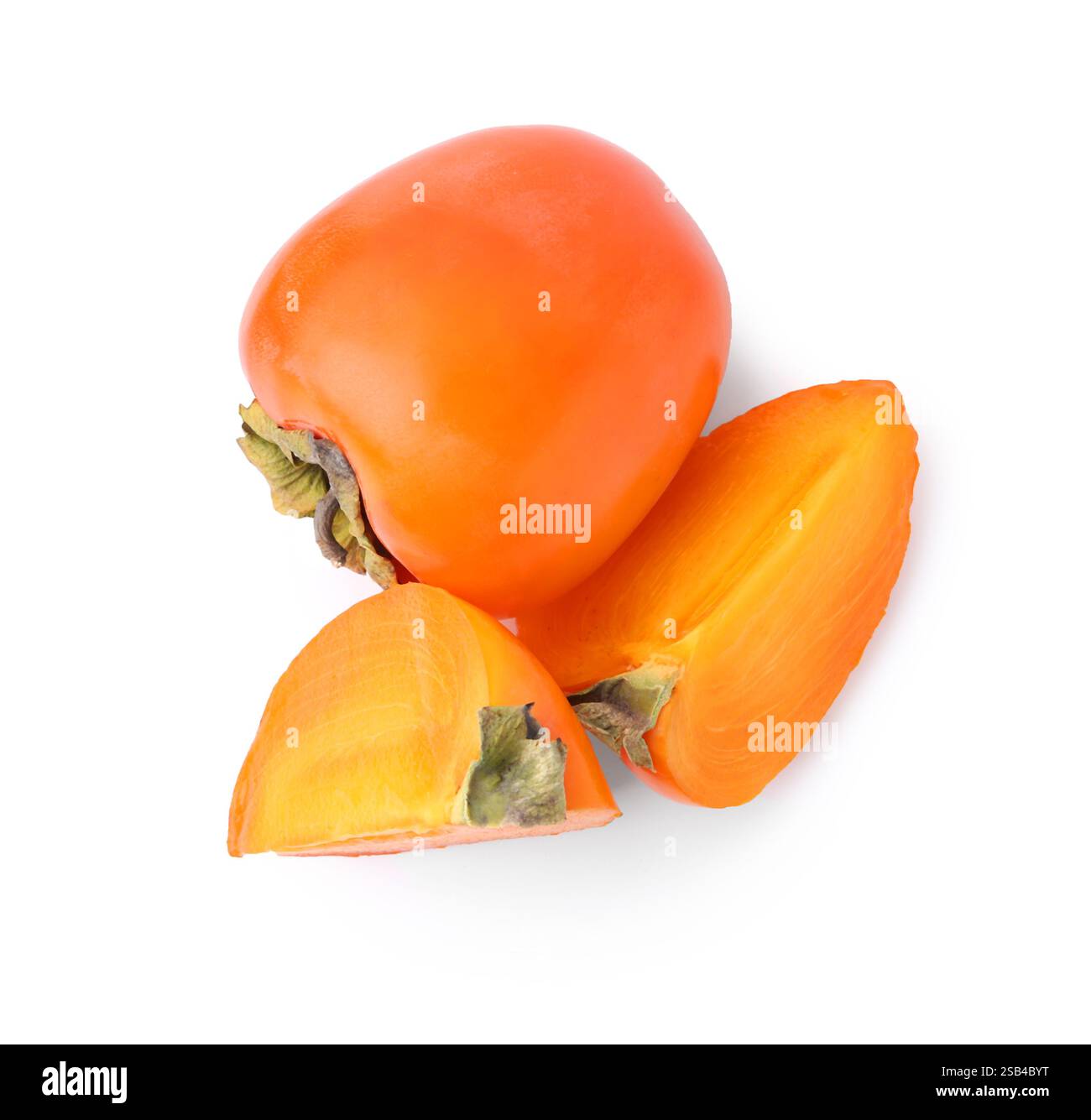 Whole and cut ripe persimmons isolated on white, top view Stock Photo ...