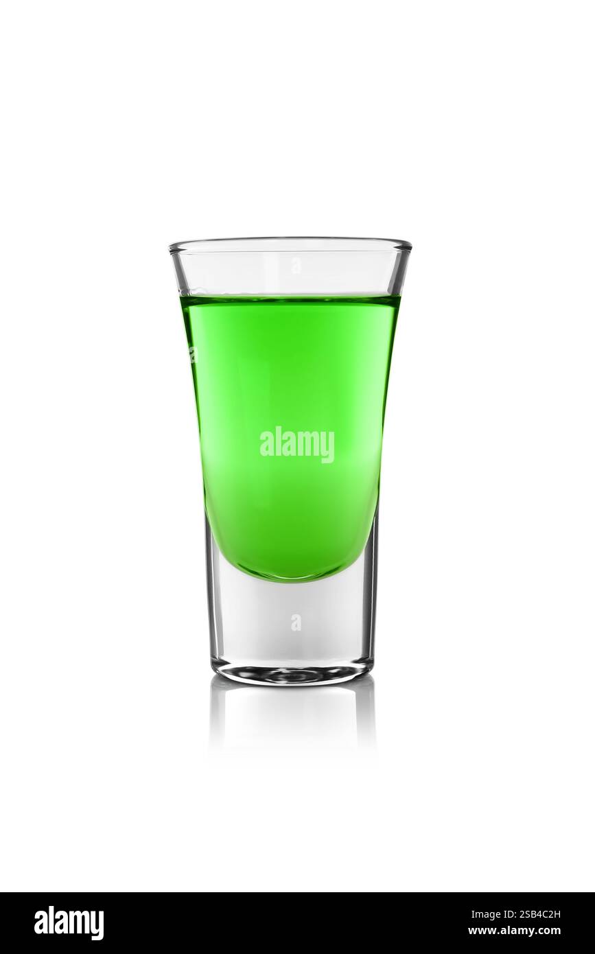 Absinthe in shot glass isolated on white Stock Photo - Alamy