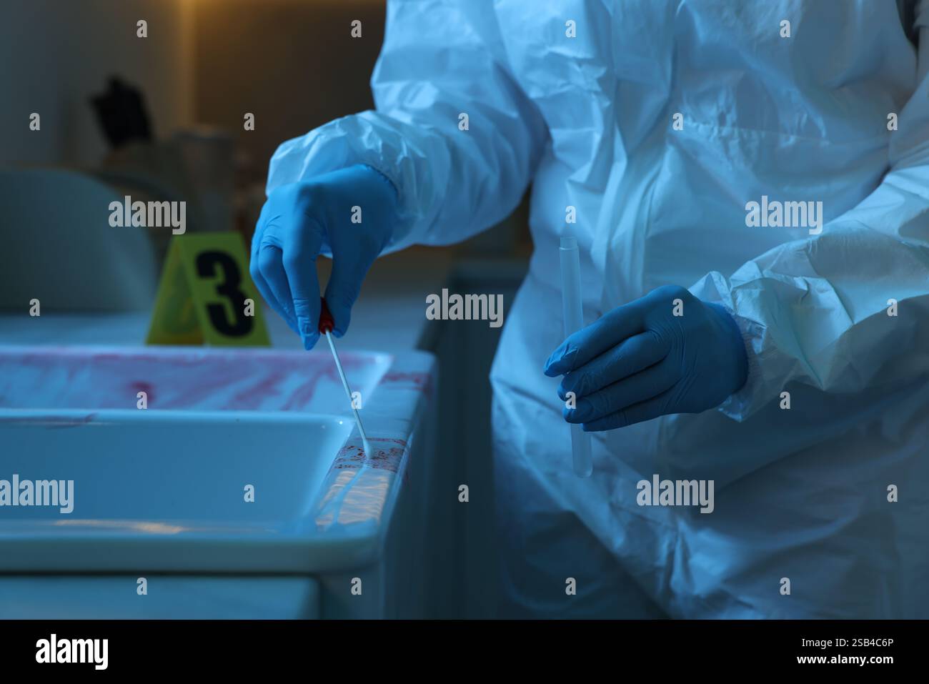 Forensic expert taking blood sample at crime scene indoors, closeup ...