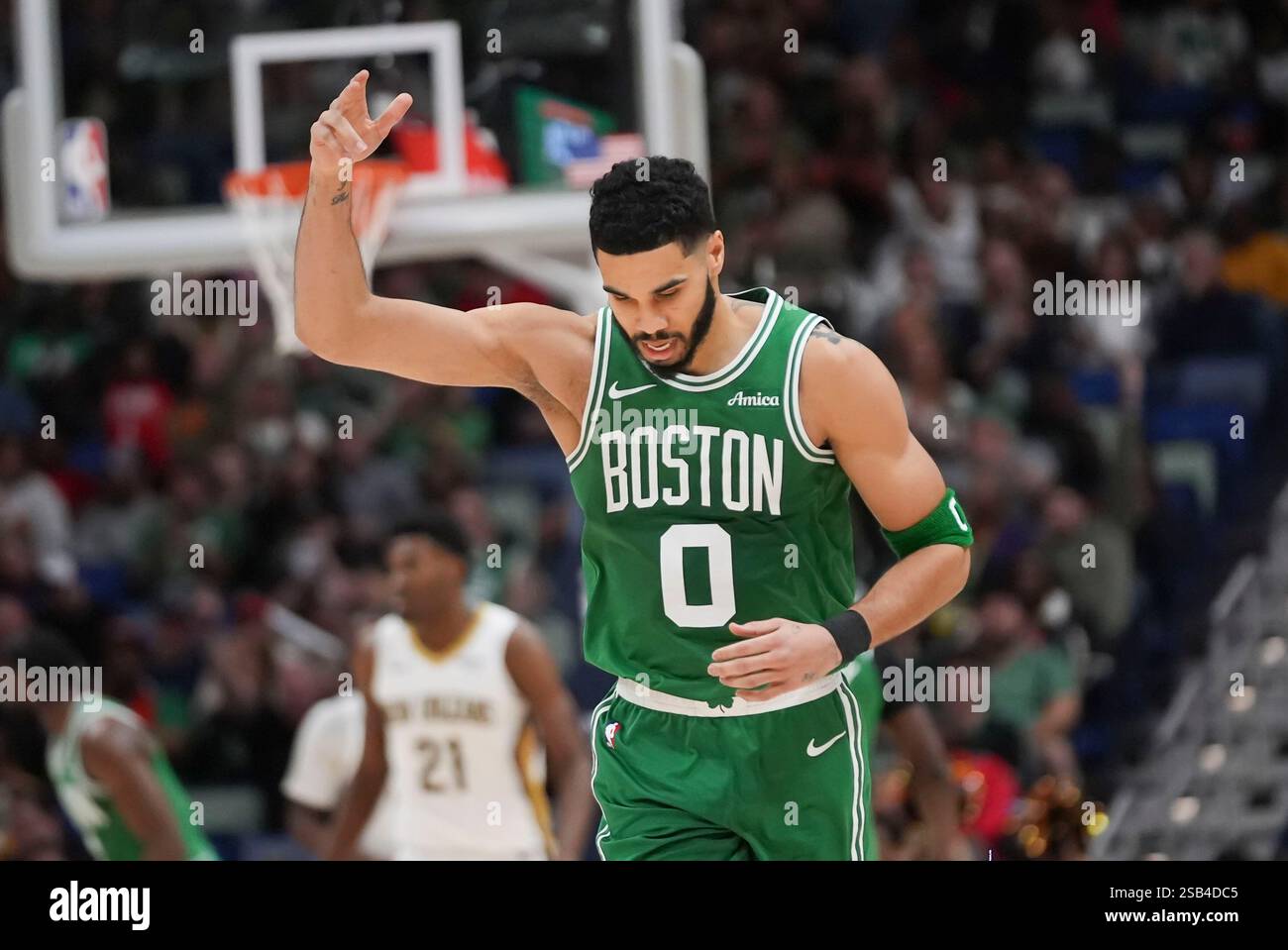 Boston Celtics forward Jayson Tatum (0) reacts after making a 3-point ...