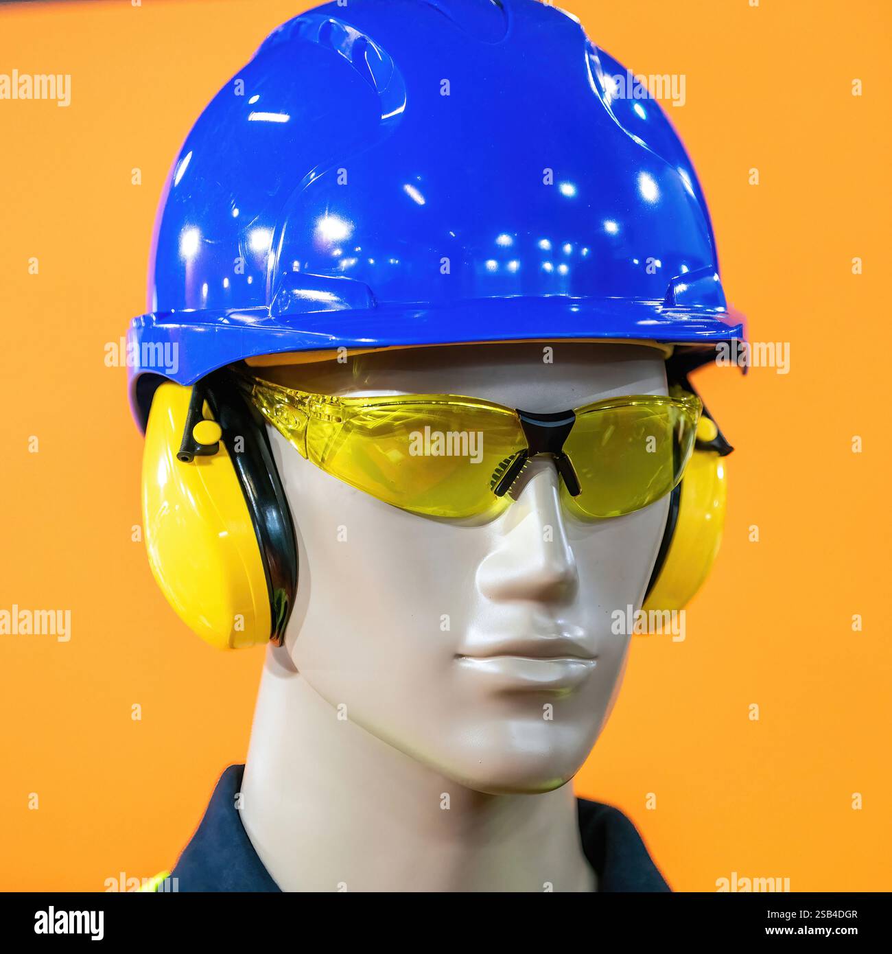 Personal protective equipment (PPE) mannequin equipped with essential ...