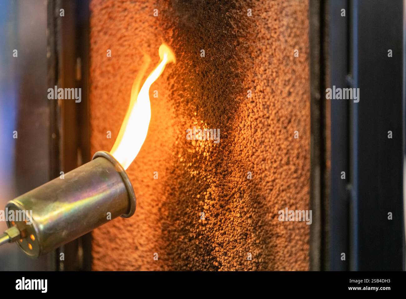 Flame torch testing flame retardant material, demonstrating fire ...