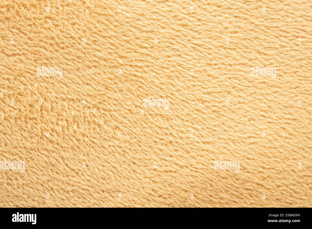 yellow fluffy fur fabric wool texture background Stock Photo - Alamy