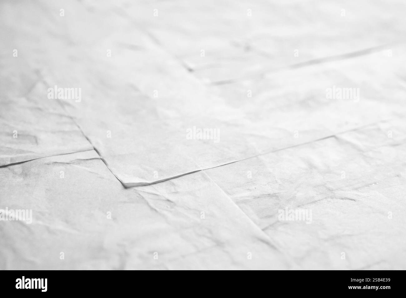 Blank white crumpled and creased paper poster texture Stock Photo - Alamy