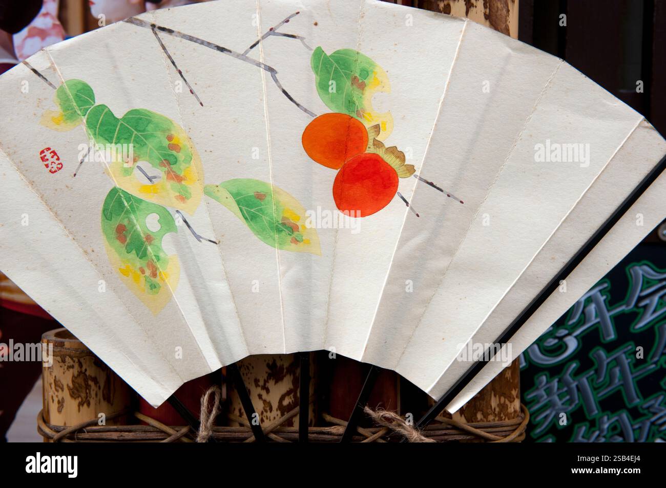Hand-painted "sensu" (Japanese folding paper fan) with artistic design ...