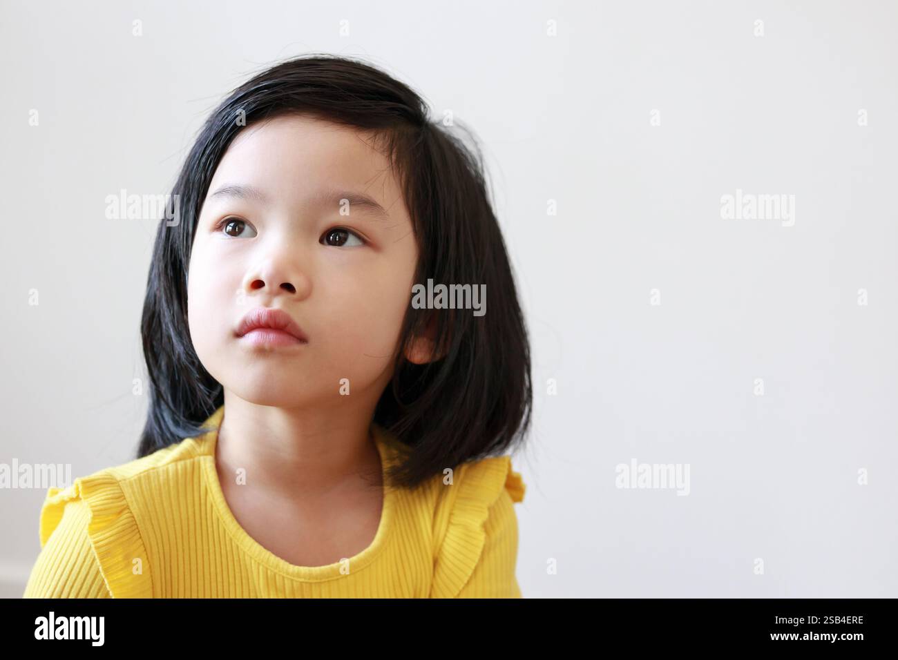 Little asian kid girl portrait on white background Stock Photo - Alamy