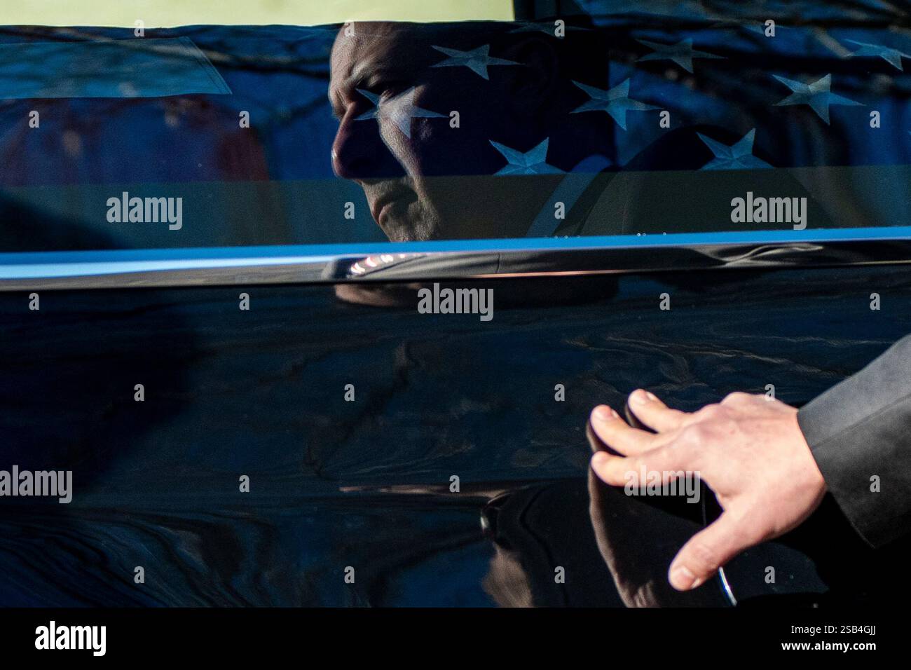 A U.S. Secret Service agent assigned to the Carter detail places his ...