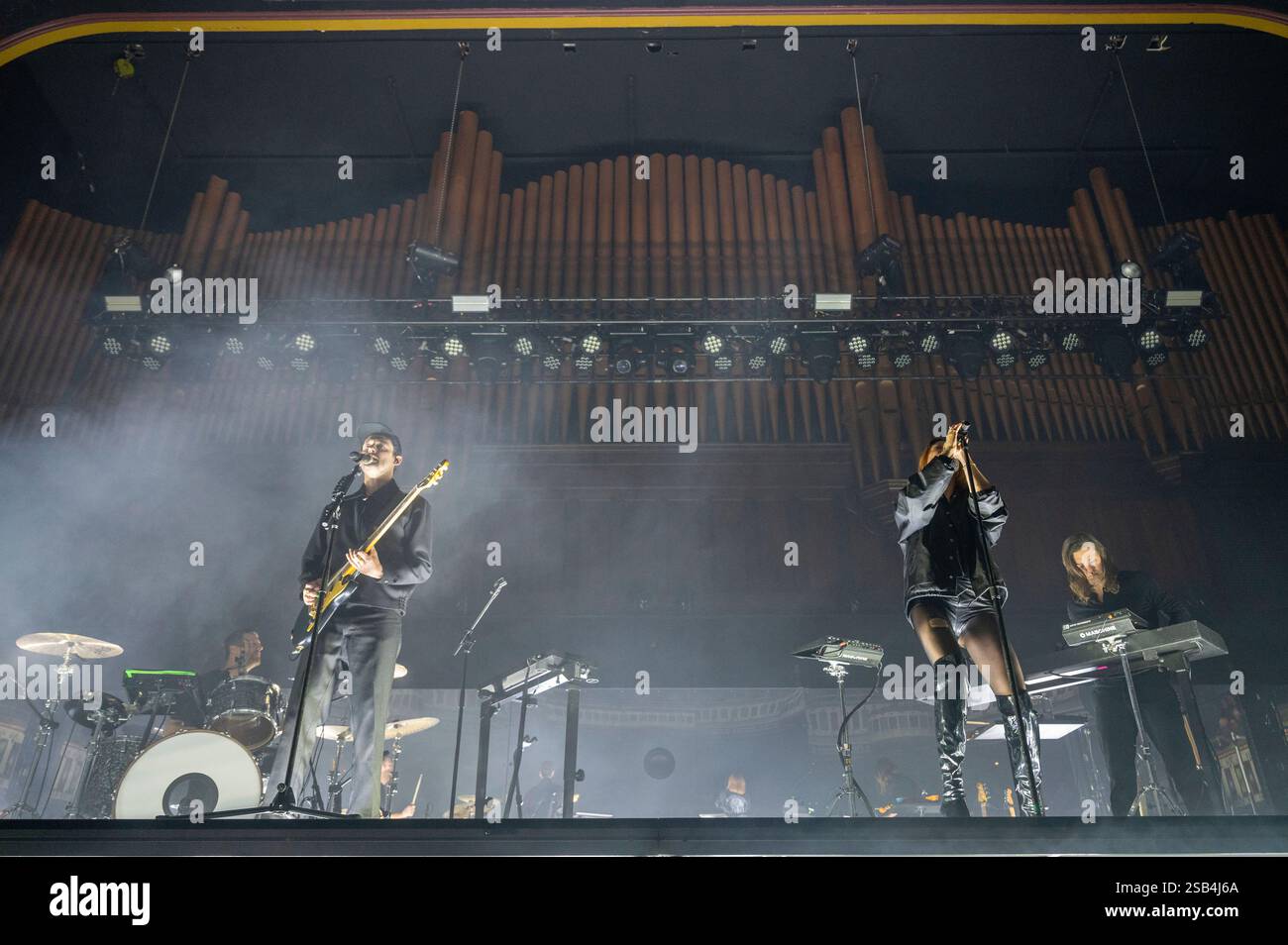 Josh Carter, left, and Sarah Barthel, of Phantogram perform on Friday ...