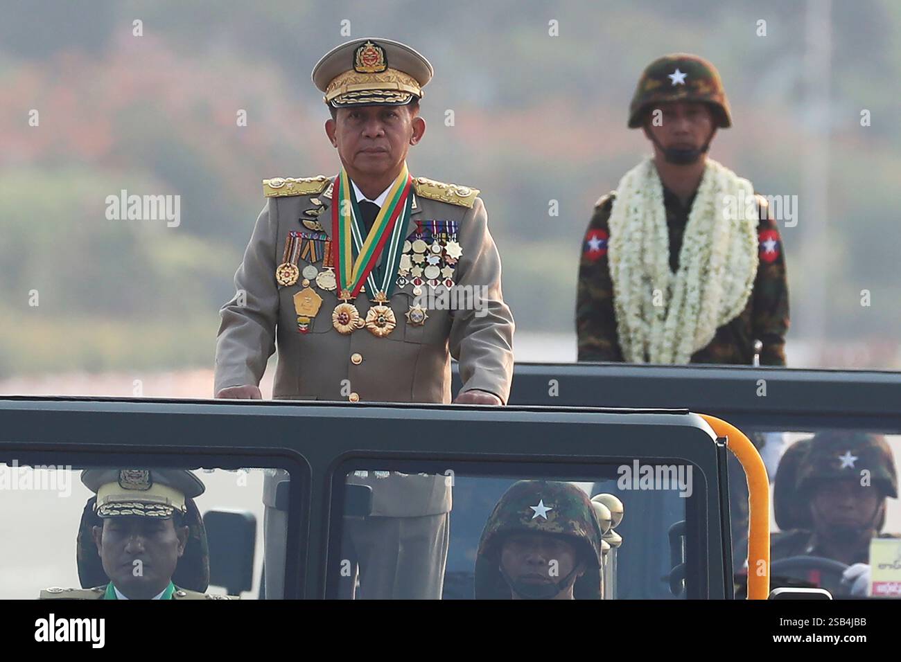 FILE - Myanmar military leader Senior Gen. Min Aung Hlaing, left, head ...