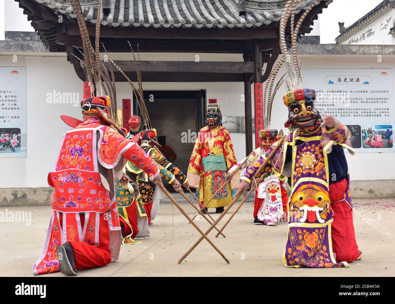 SHANGRAO, CHINA - JANUARY 30, 2025 - Artists watch a Nuo dance ...