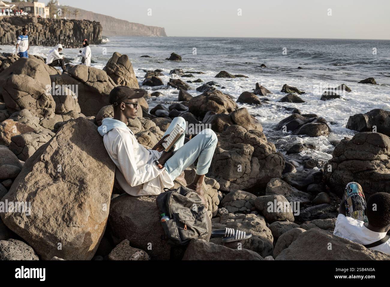 Dressed in white robes to symbolize purity and equality before God ...
