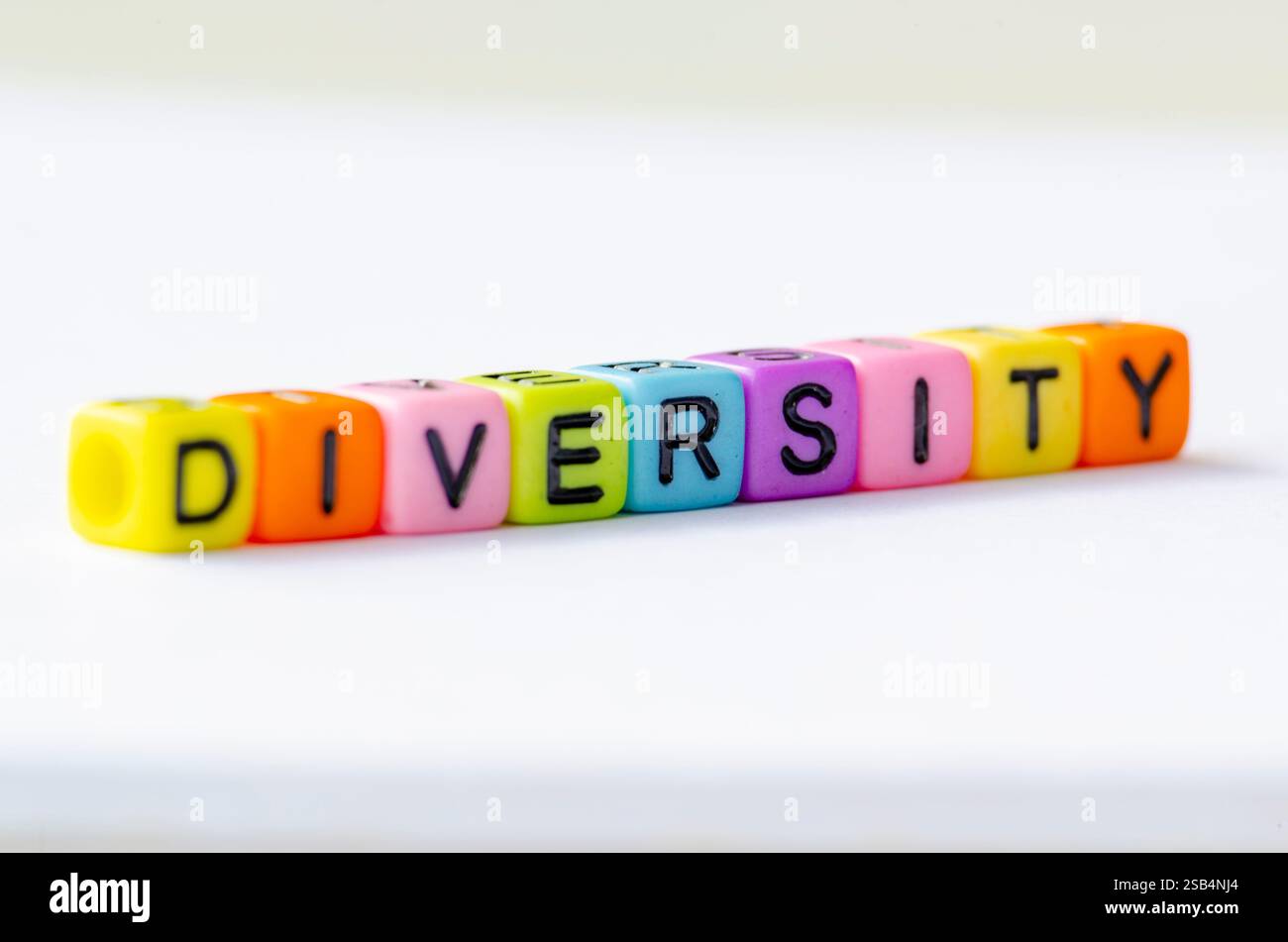 Diversity text on colorful plastic alphabet beads representing Business ...