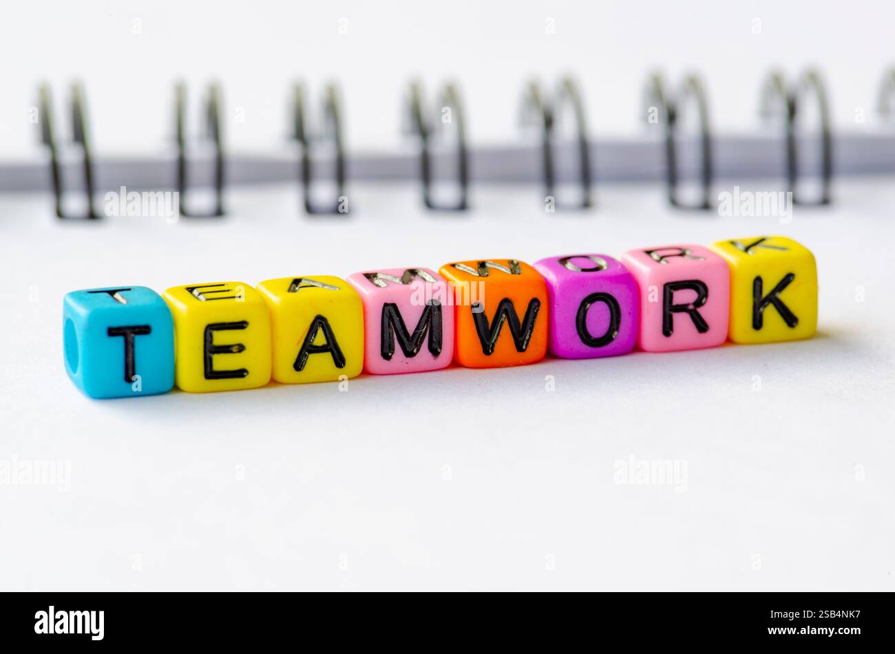 Teamwork text on colorful plastic alphabet beads. Business concept ...