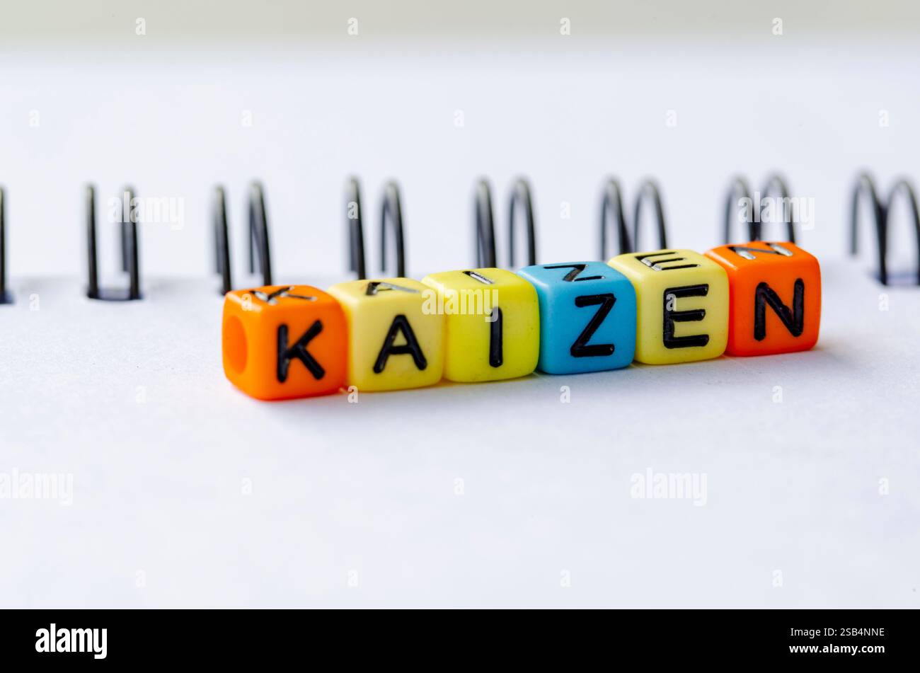 KAIZEN text on colorful plastic alphabet continuous process improvement ...