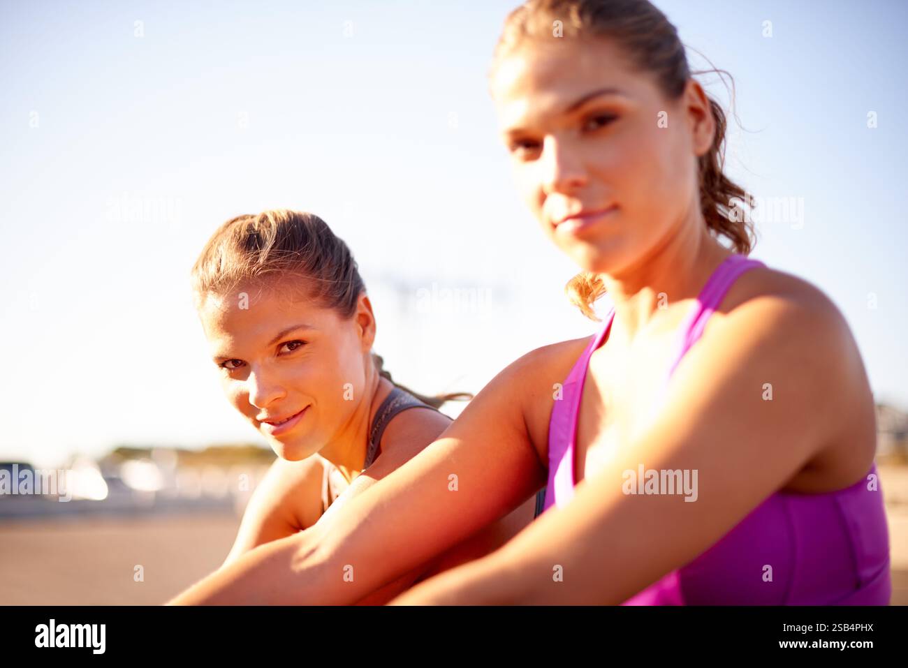 Women, runner and twins with portrait in street for training, smile or ...