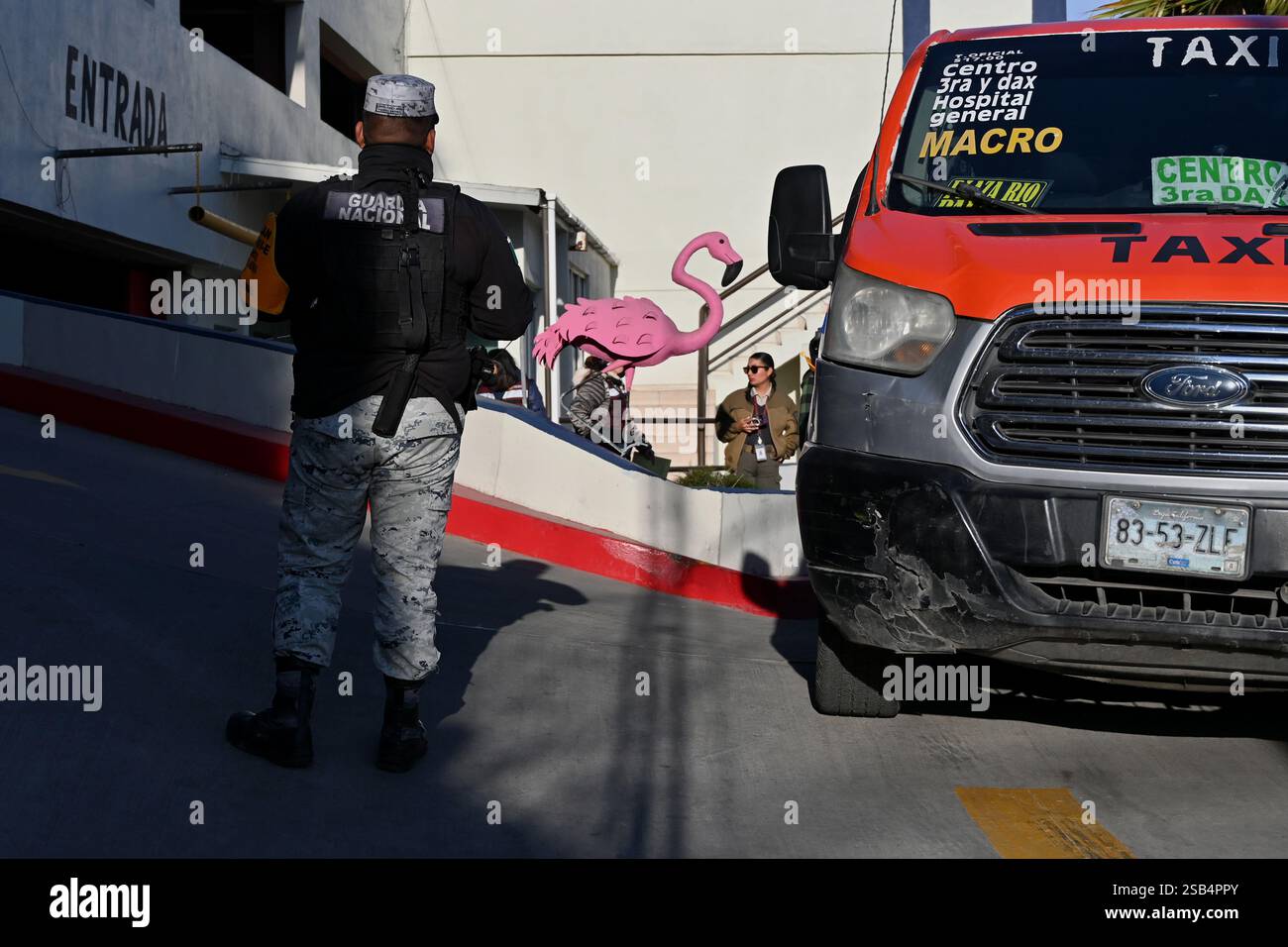 Members of the Mexican National Guard instruct deported migrants in a ...