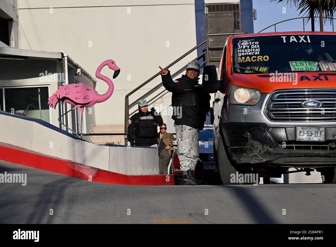 Members of the Mexican National Guard instruct deported migrants in a ...