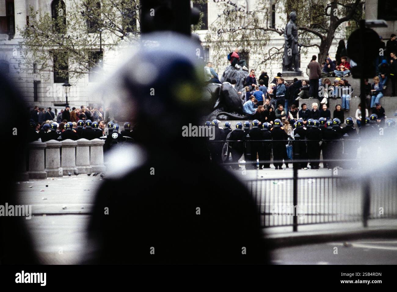 Anti war demonstration in central London in 2003 with riot police ...