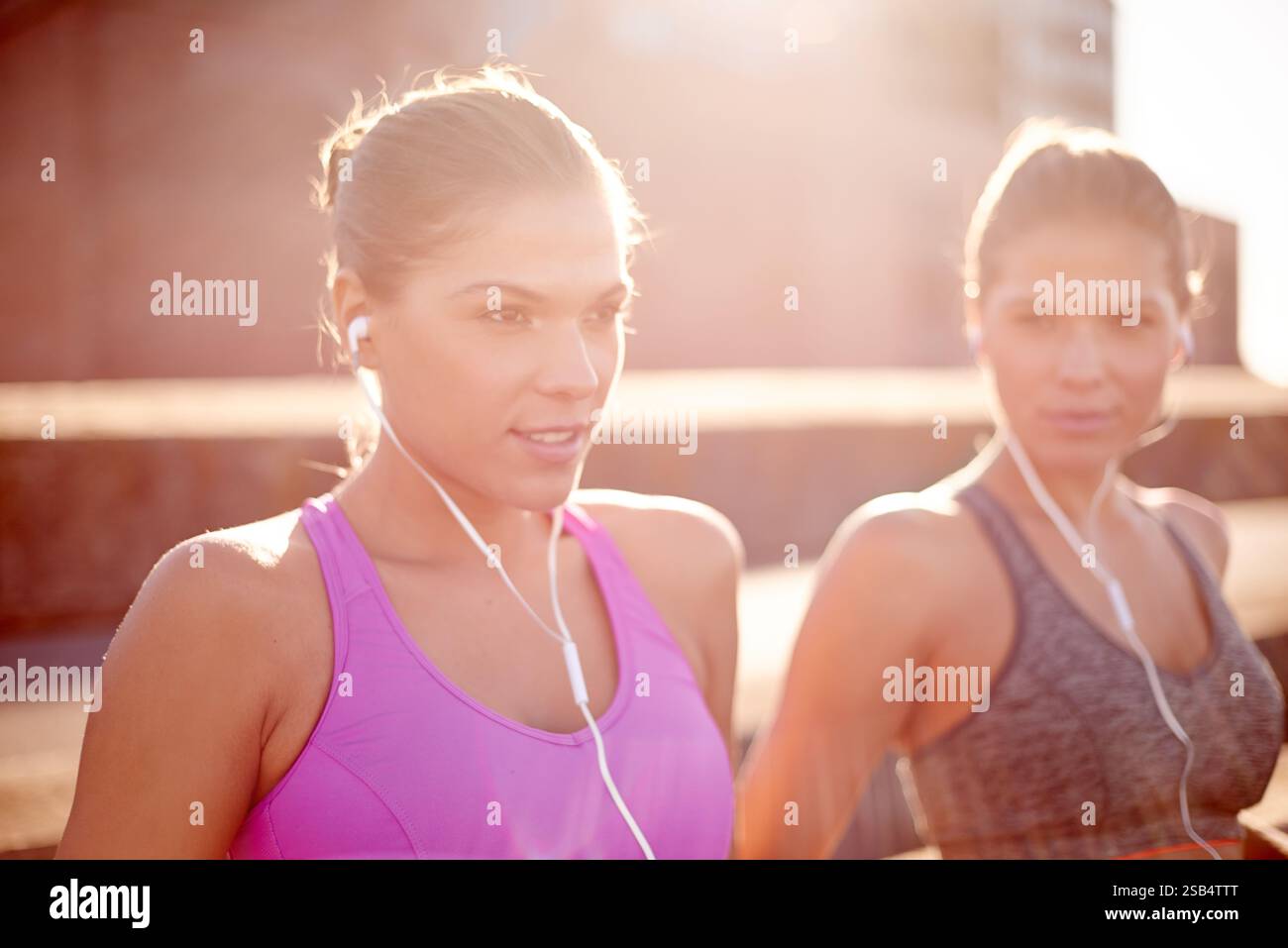 Fitness, music and women with earphones, exercise and training with ...