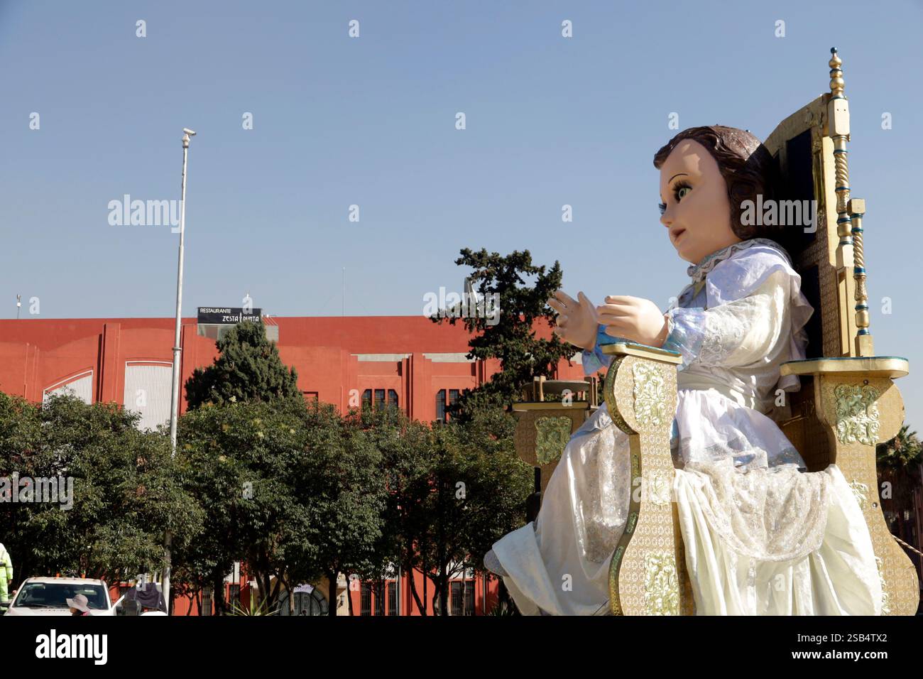 A Monumental Baby Jesus Doll is seen at the first Tamale Fair as part ...