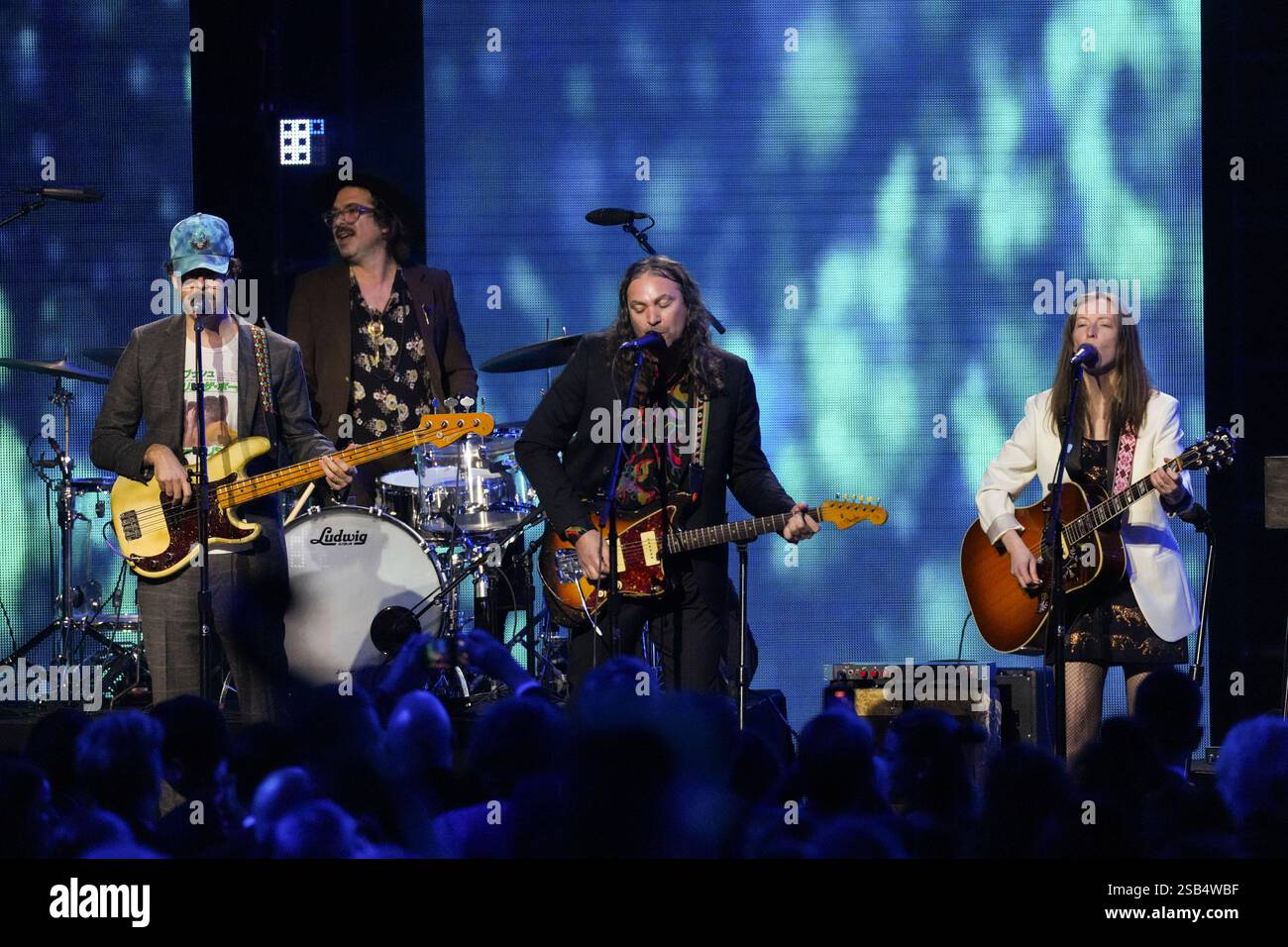 Adam Granduciel, second right, and 'The War on Drugs' perform during ...