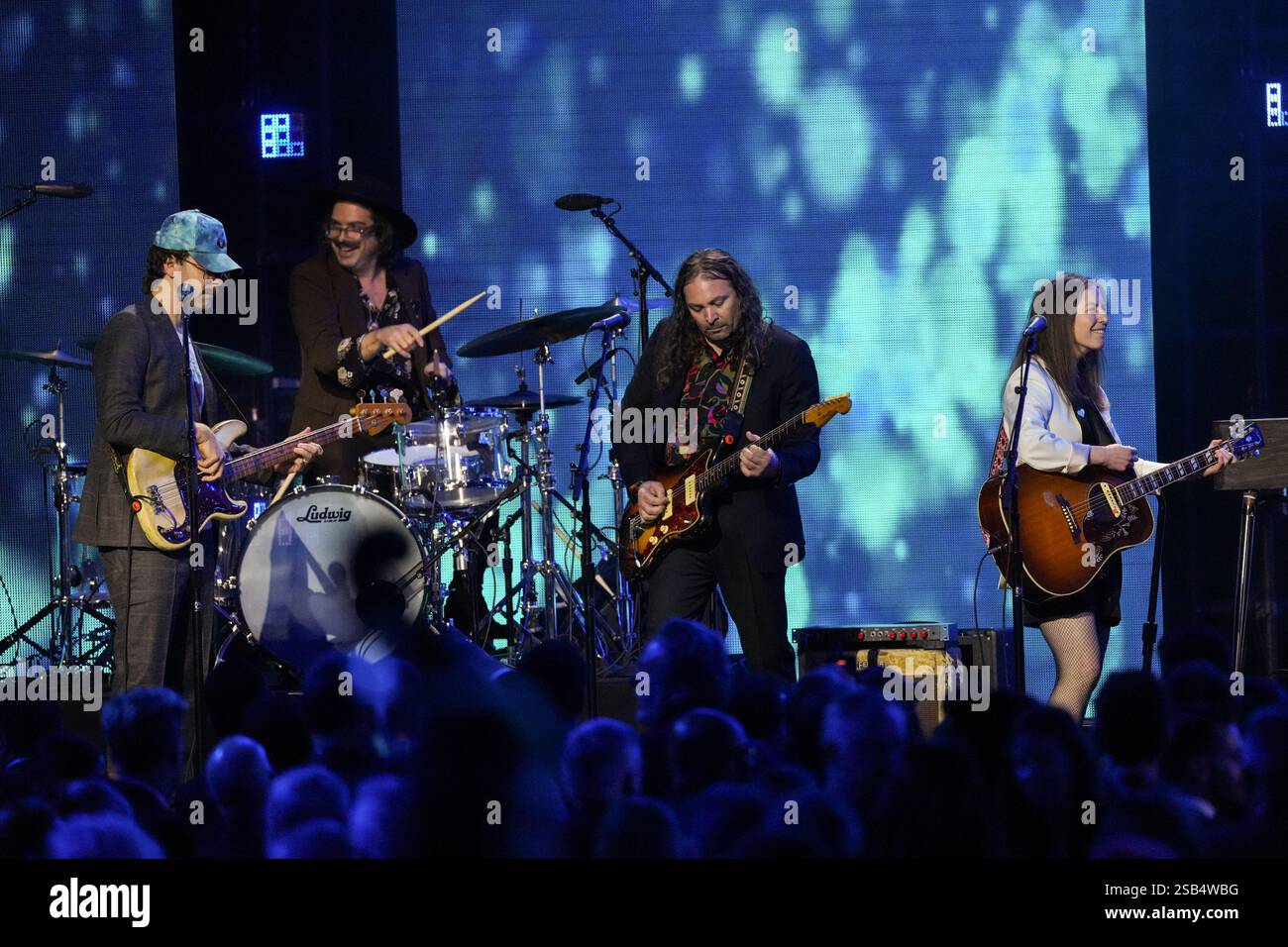 Adam Granduciel, second right, and 'The War on Drugs' perform during ...