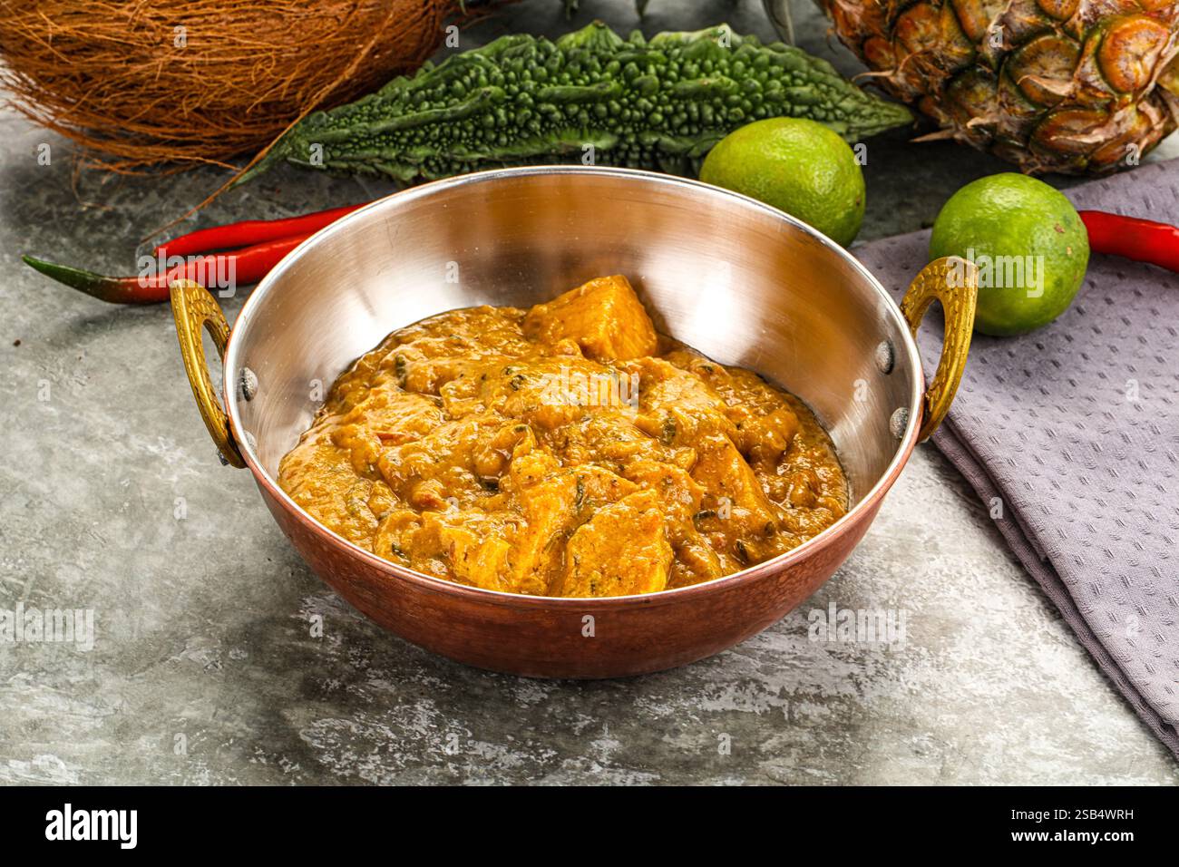 Indian cuisne - Chicken massala with sauce and spices Stock Photo - Alamy