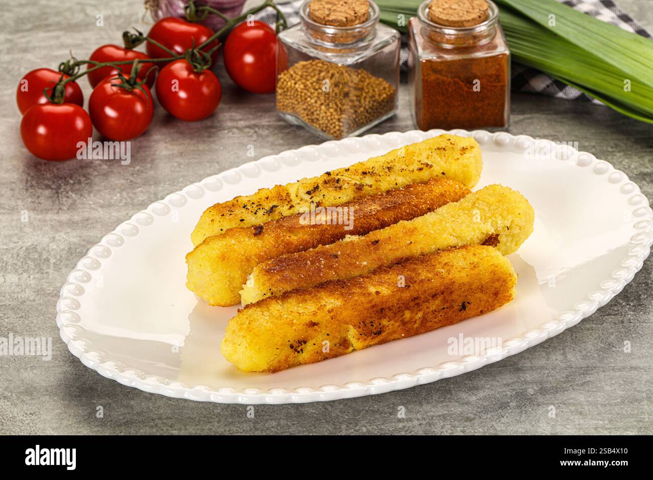 Crispy breaded mozarella cheese sticks appetizer Stock Photo - Alamy