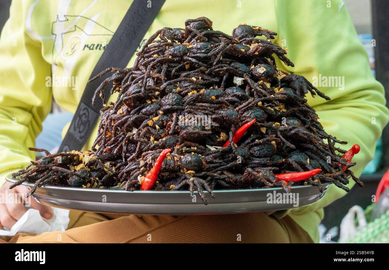 Tray of cooked tarantulas hi-res stock photography and images - Alamy