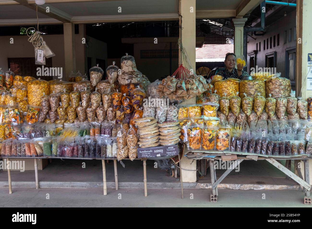 Dried fruit, Flowers and herbs at a roadside market in Cheung Prey ...