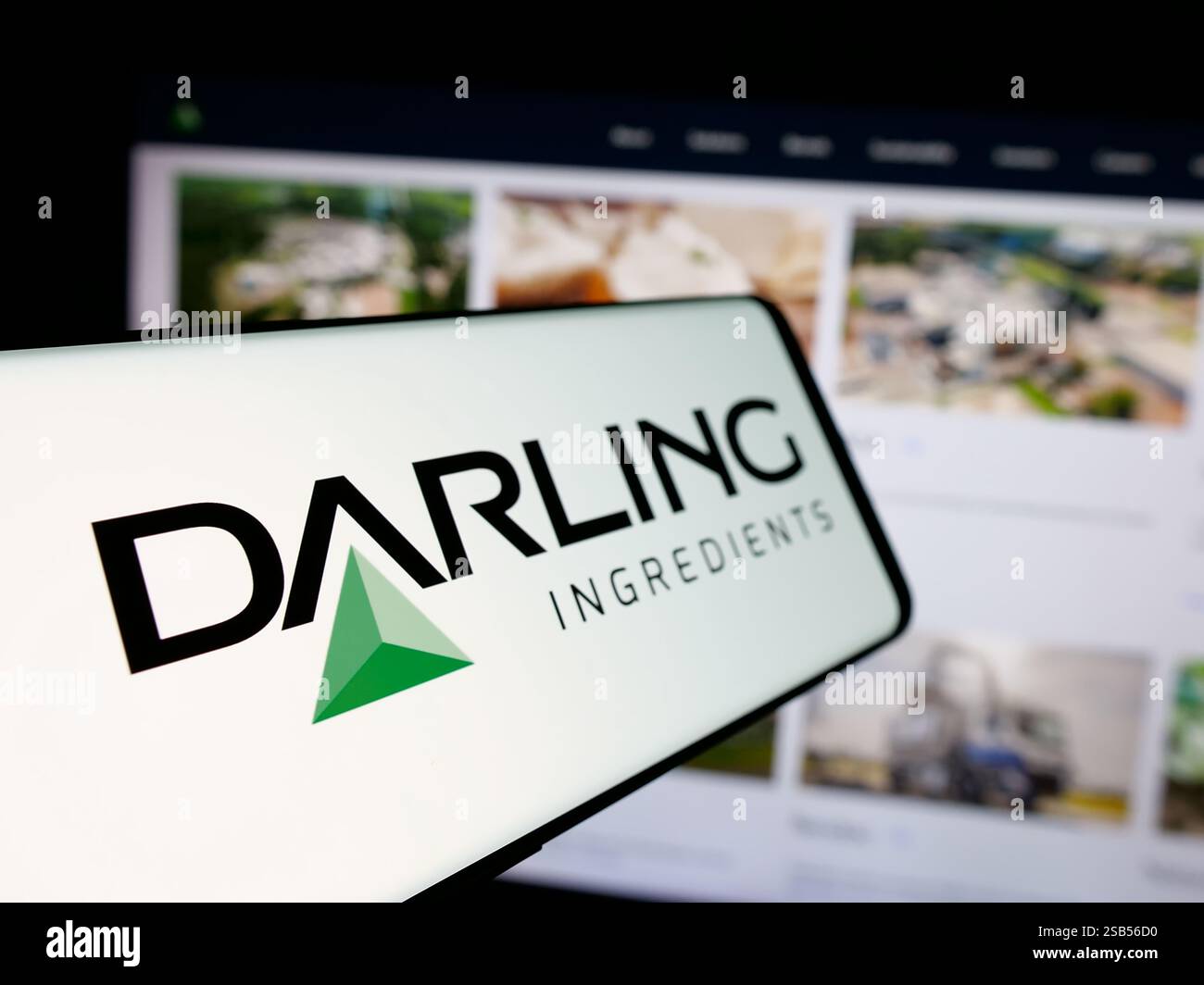 In this photo illustration, a smartphone with the logo of American ...