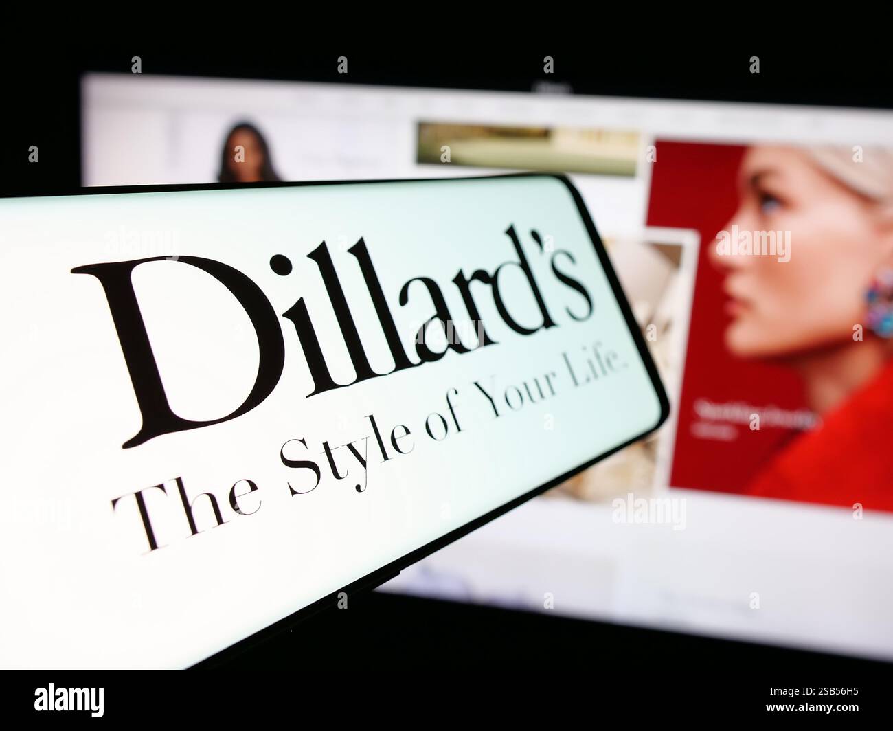 In this photo illustration, a cellphone with the logo of American department store company ...