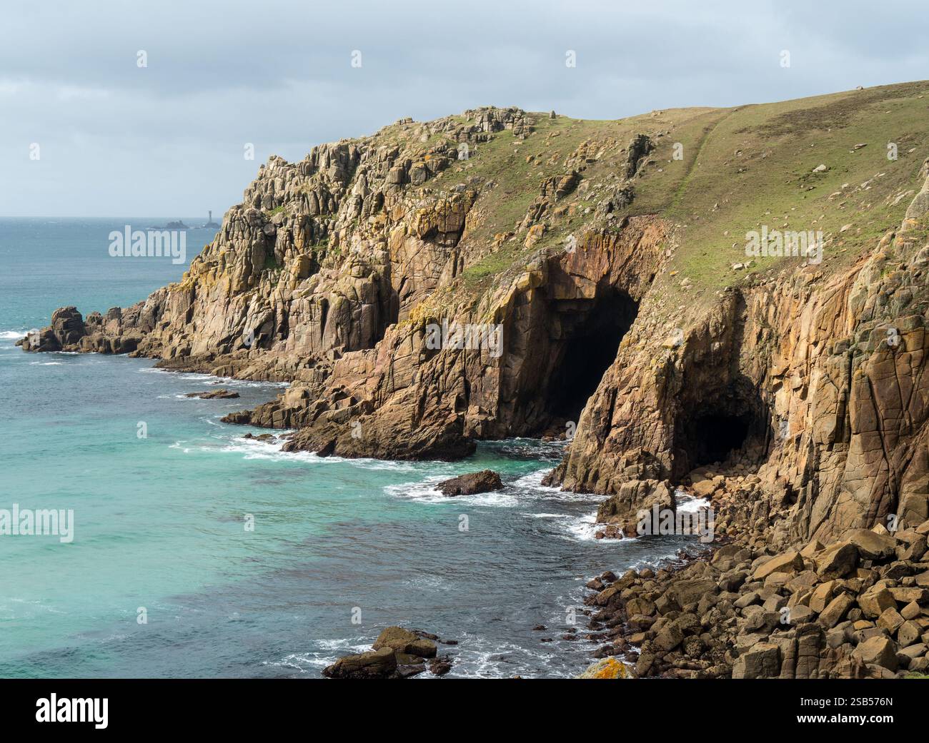 Sea caves and rocky sea cliffs and coastline as seen from the South ...