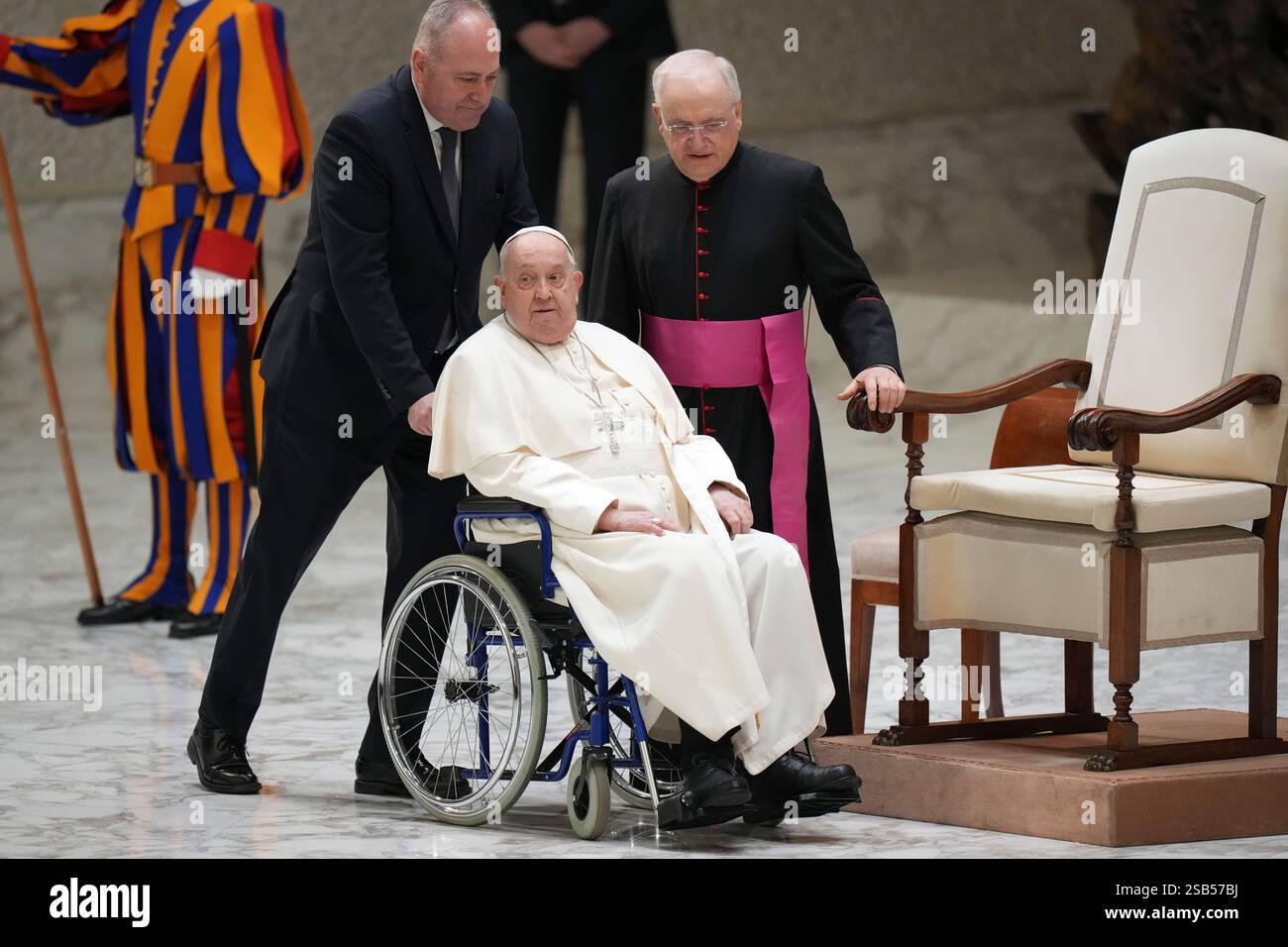 Pope Francis leaves at the end of a Jubilee audience in the Pope Paul ...