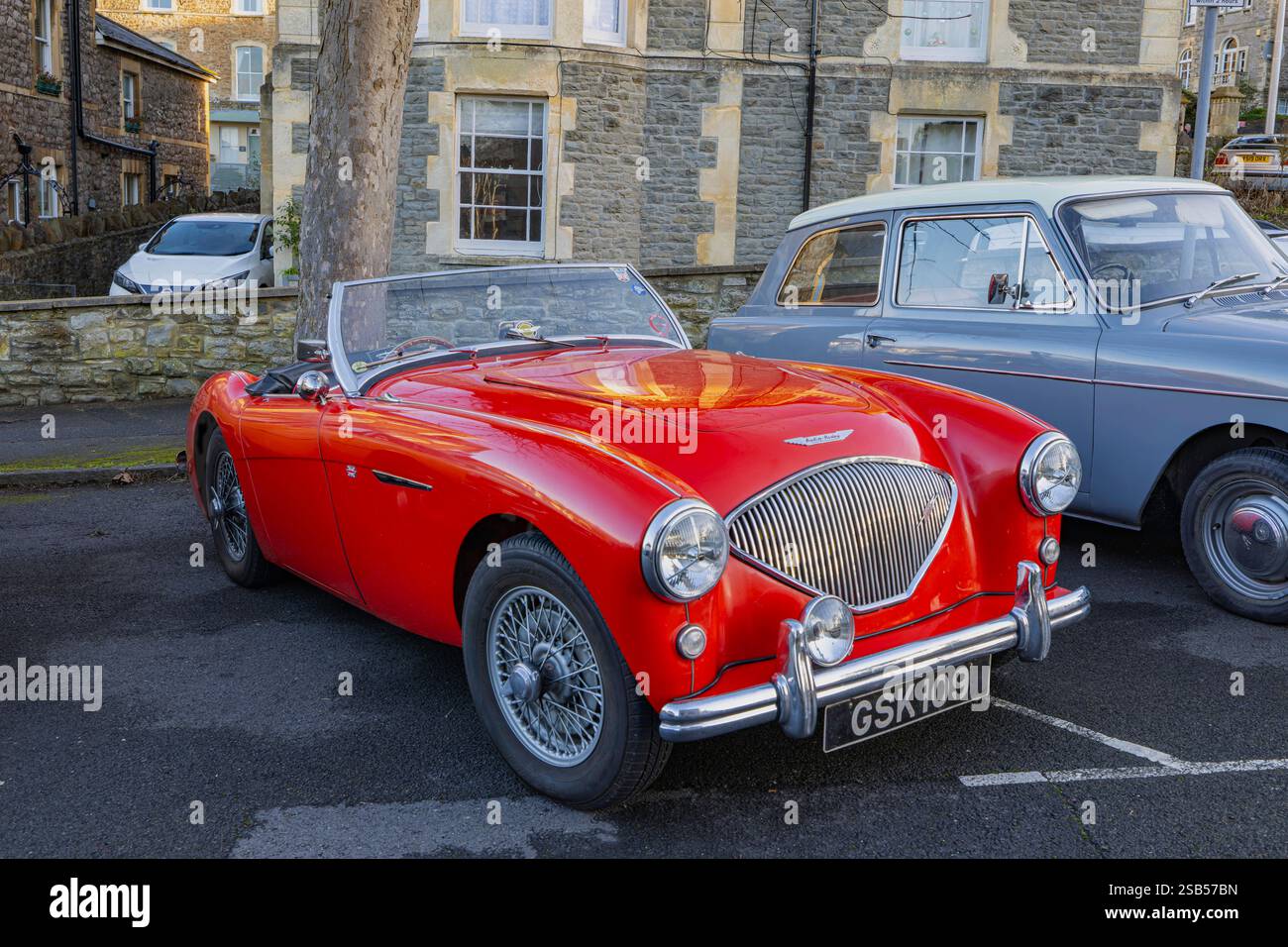 Austin Healey red wire wheels Stock Photo - Alamy