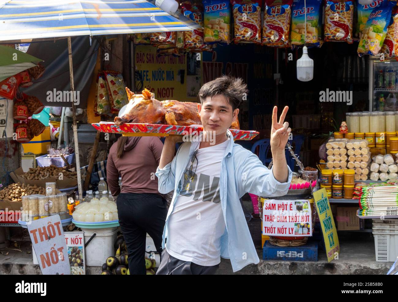The market at Chau Doc in Vietnam. Stalls selling seafood and noodles ...