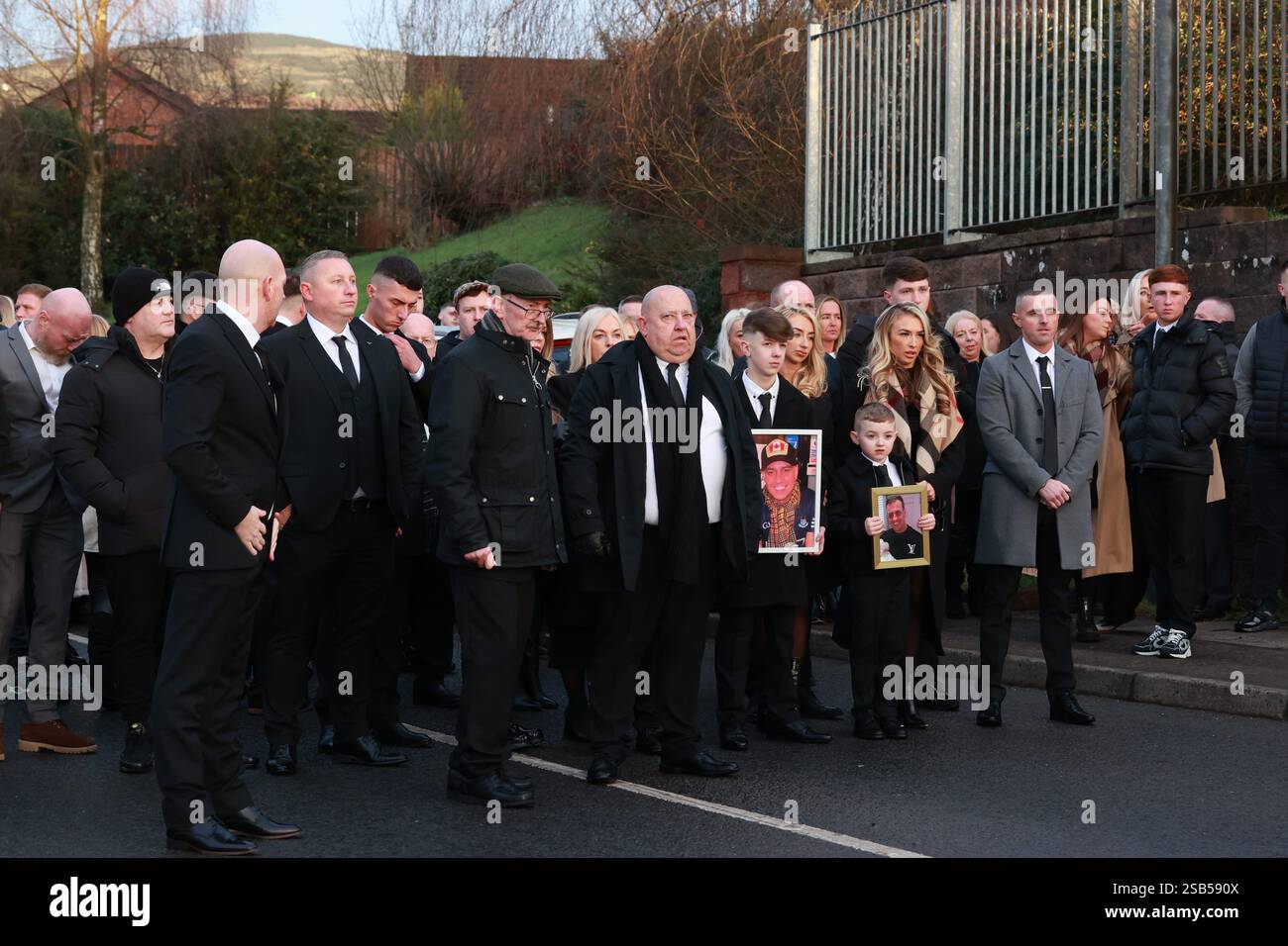 Family members, including Billy (centre) the father of murdered Belfast ...