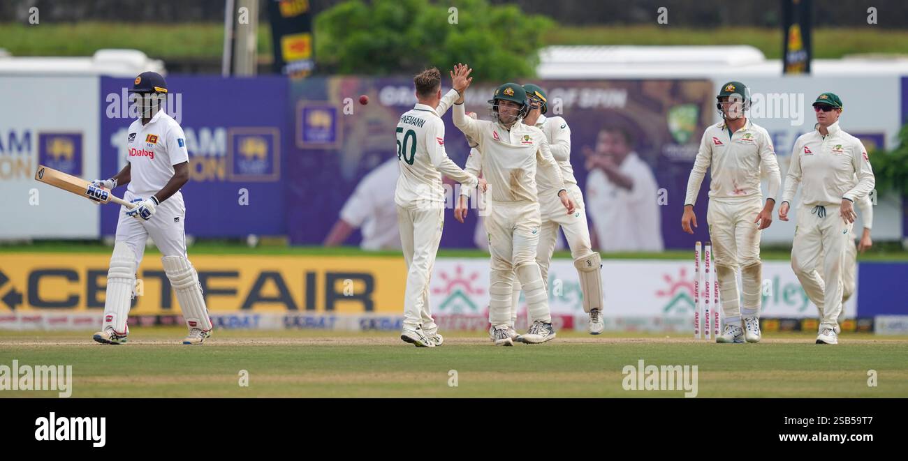 Sri Lanka's Nishan Peiris leaves the ground after losing his wicket as ...