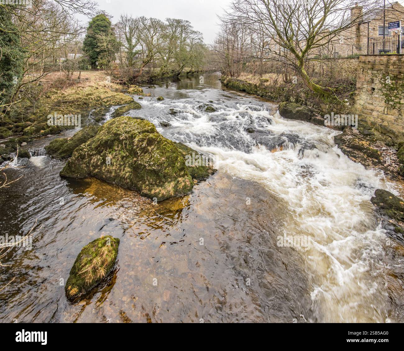 The 'Queens Rock' beneath the footbridge over the River Ribble in ...