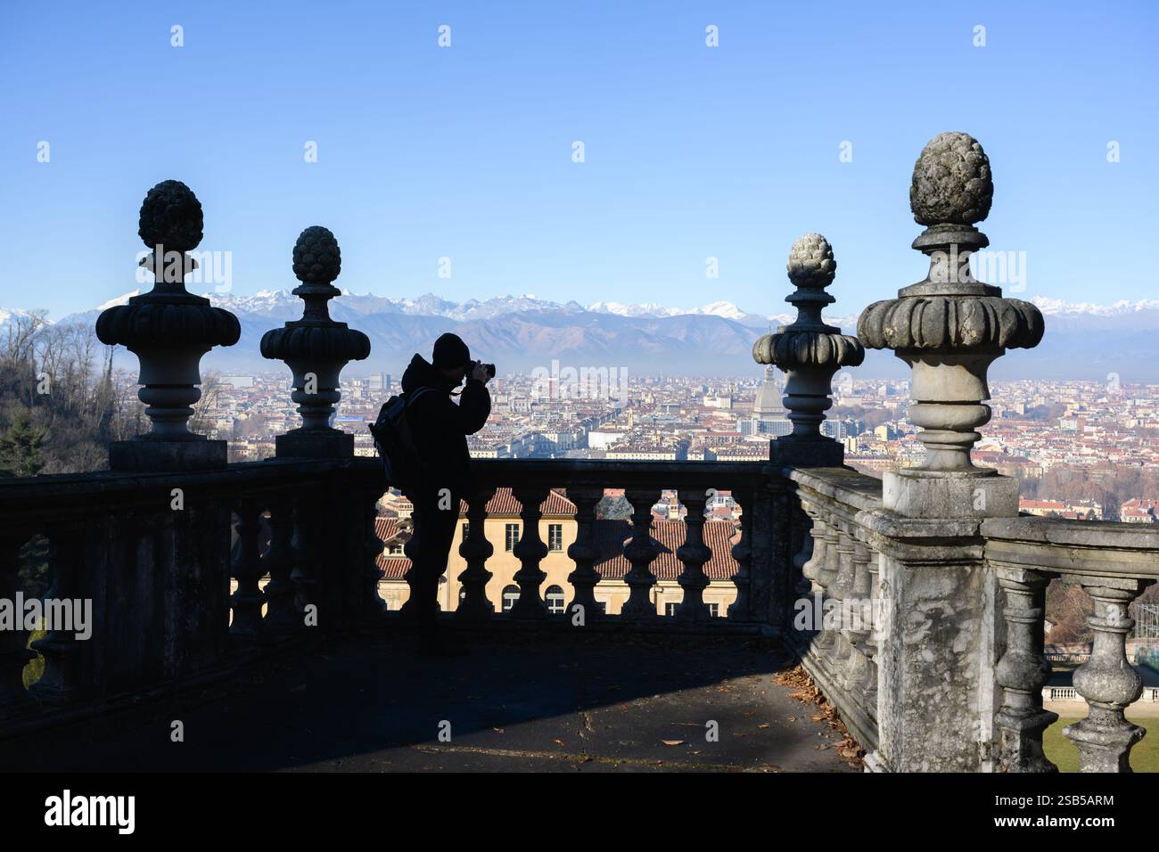 A tourist take a photo of Turin city (Torino) from Villa della Regina ...