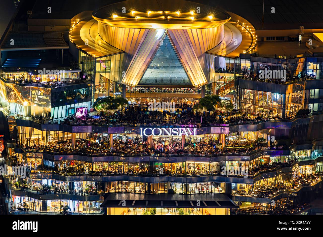 Bangkok skyline, Icon Siam shopping mall, landscape along Chao Phraya river at night, Thailand ...