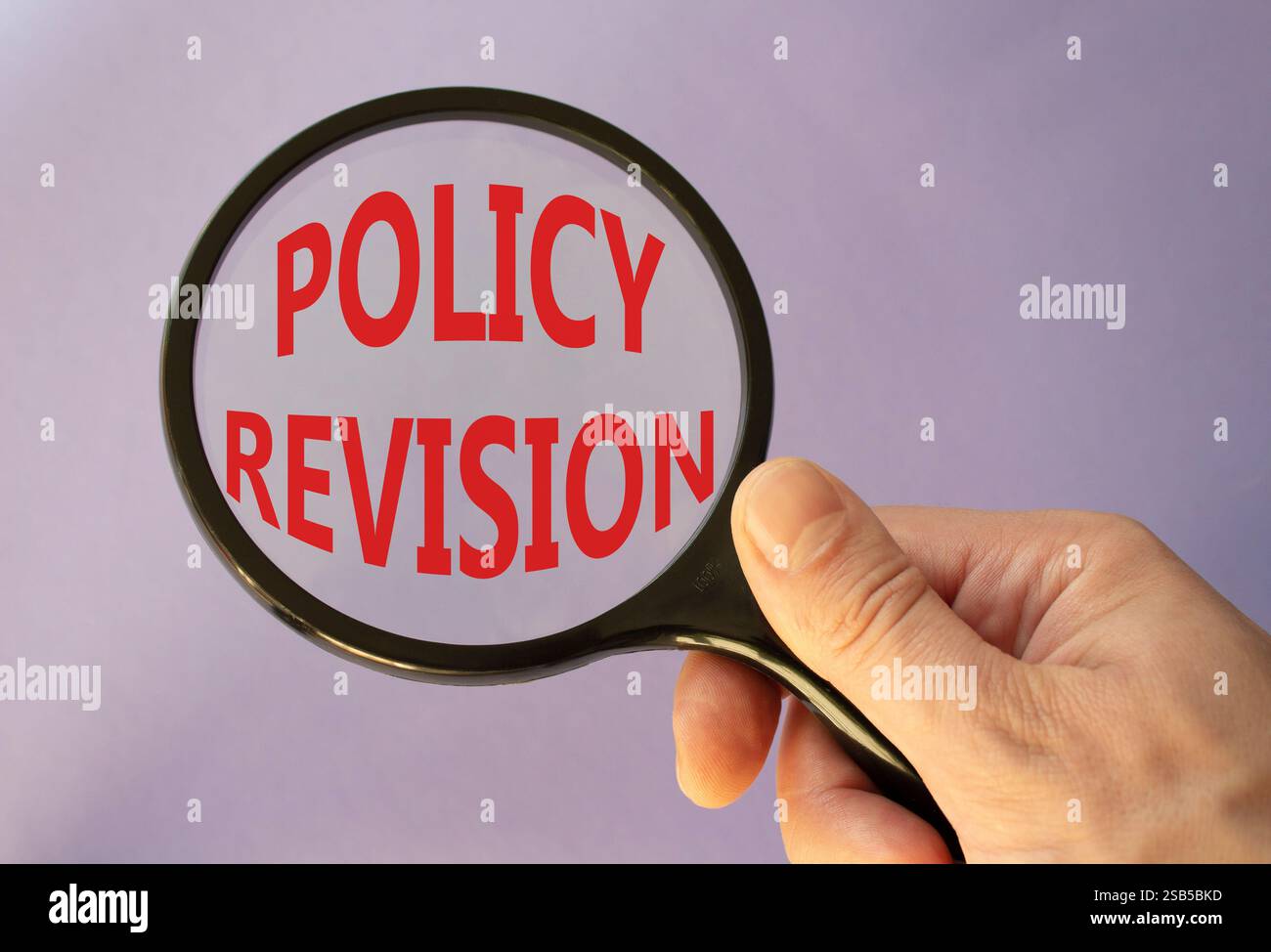 Policy revision symbol. Concept word Policy revision on magnifying ...