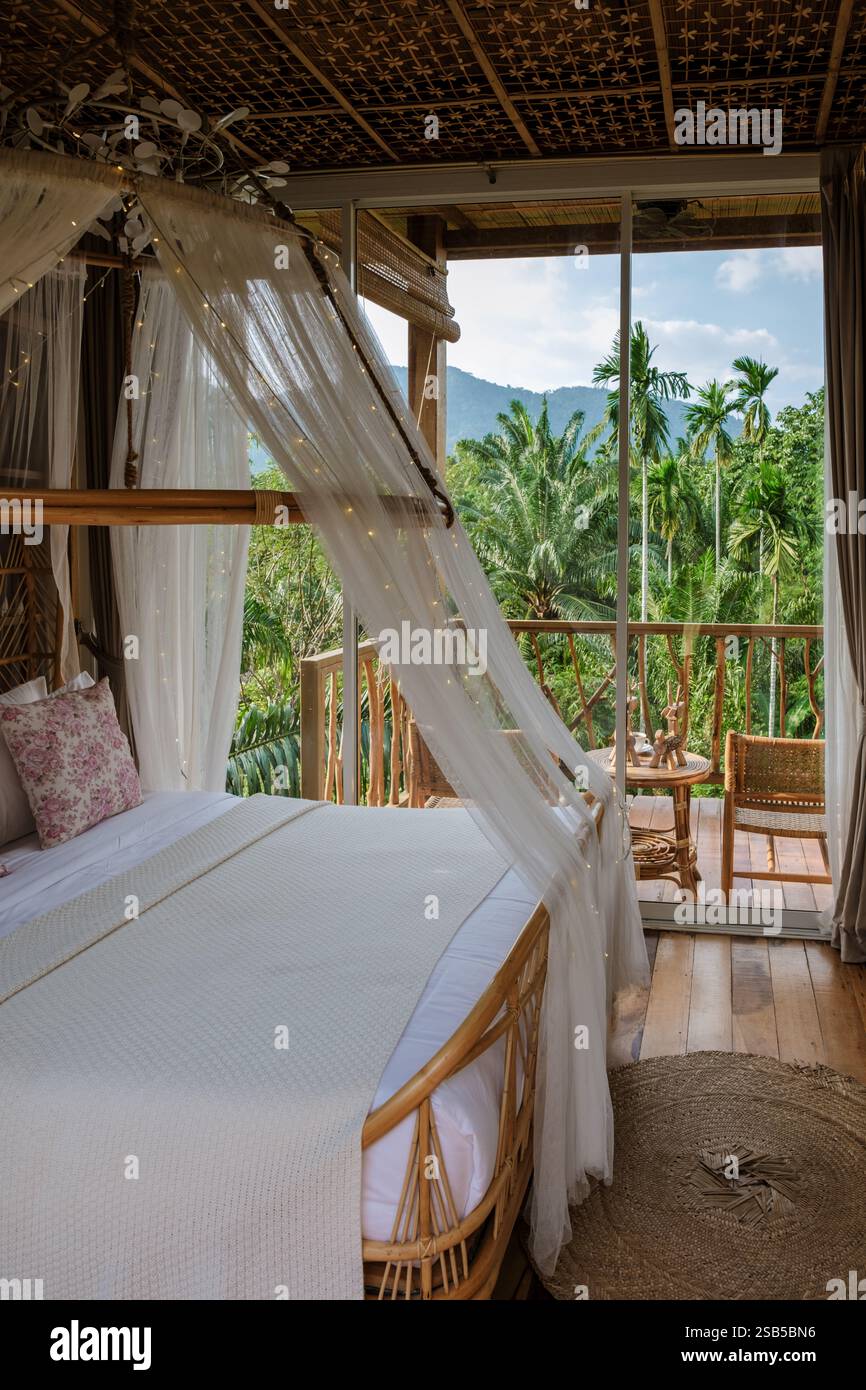 Nestled in the heart of Bali, a beautiful bamboo retreat offers serene ...