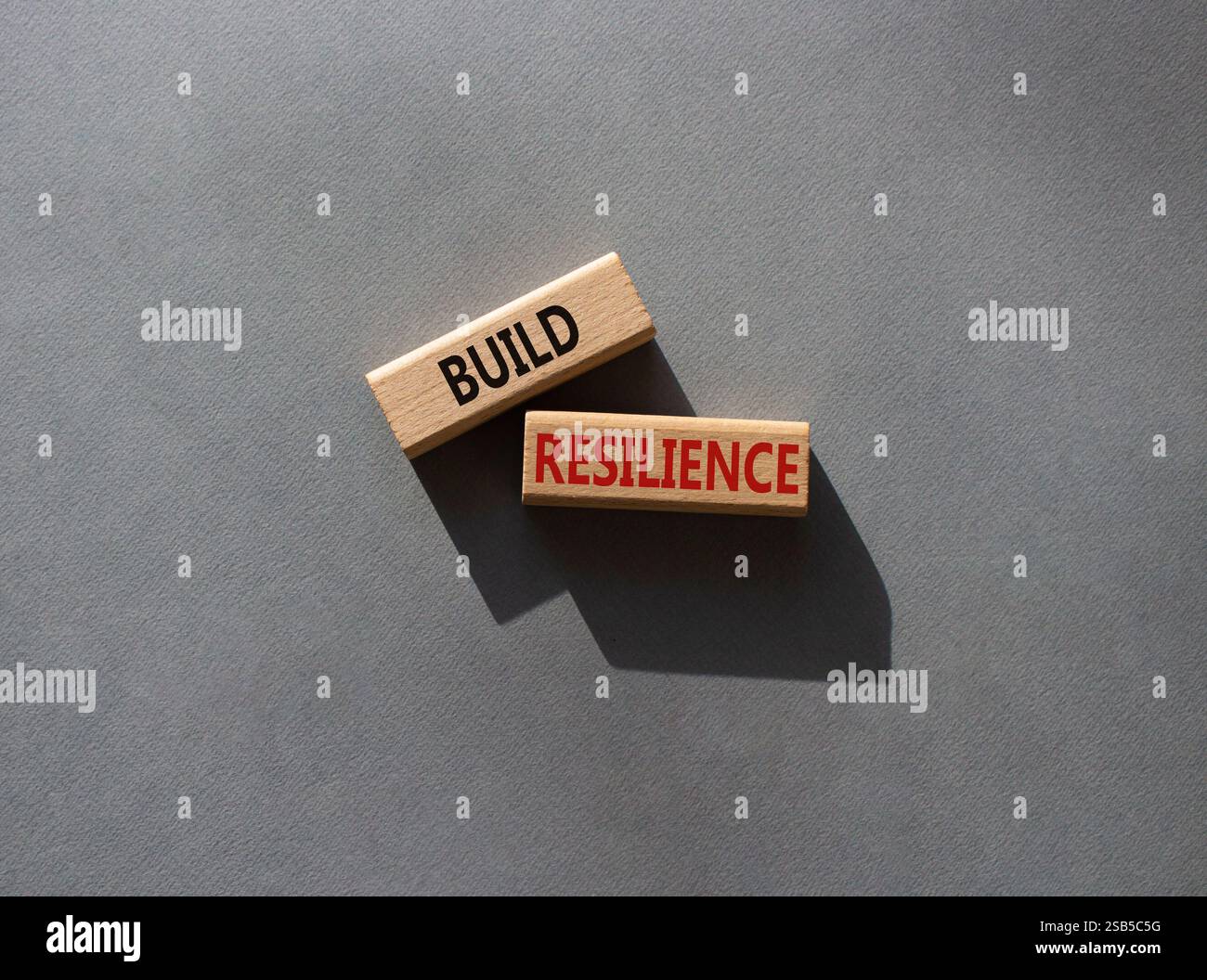 Build momentum symbol. Wooden blocks with words Build momentum ...
