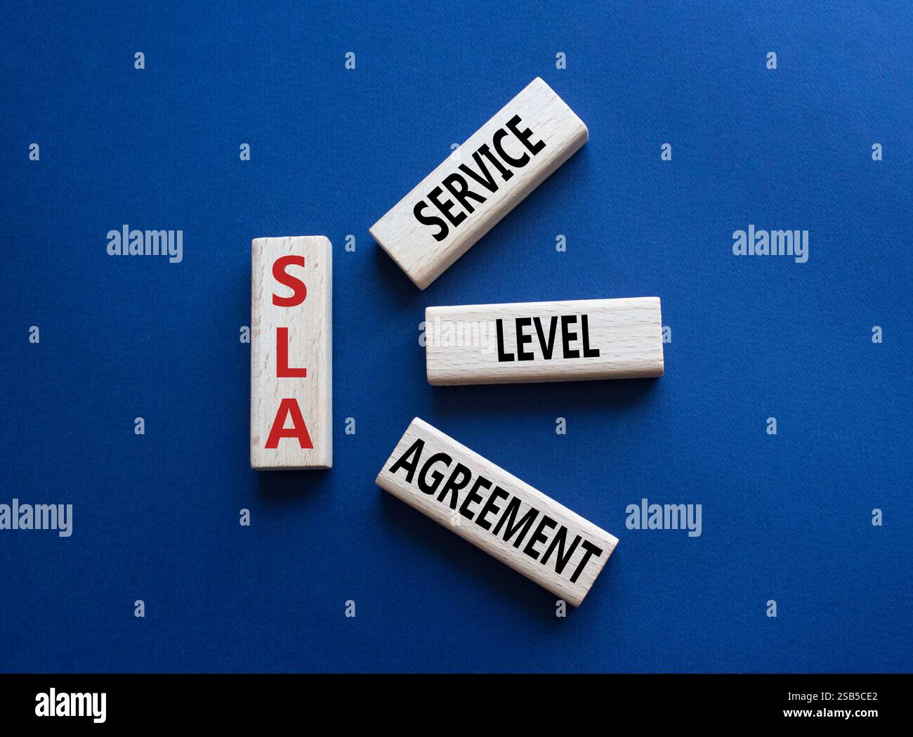 SLA - Service Level Agreement. Wooden blocks with word SLA. Beautiful ...
