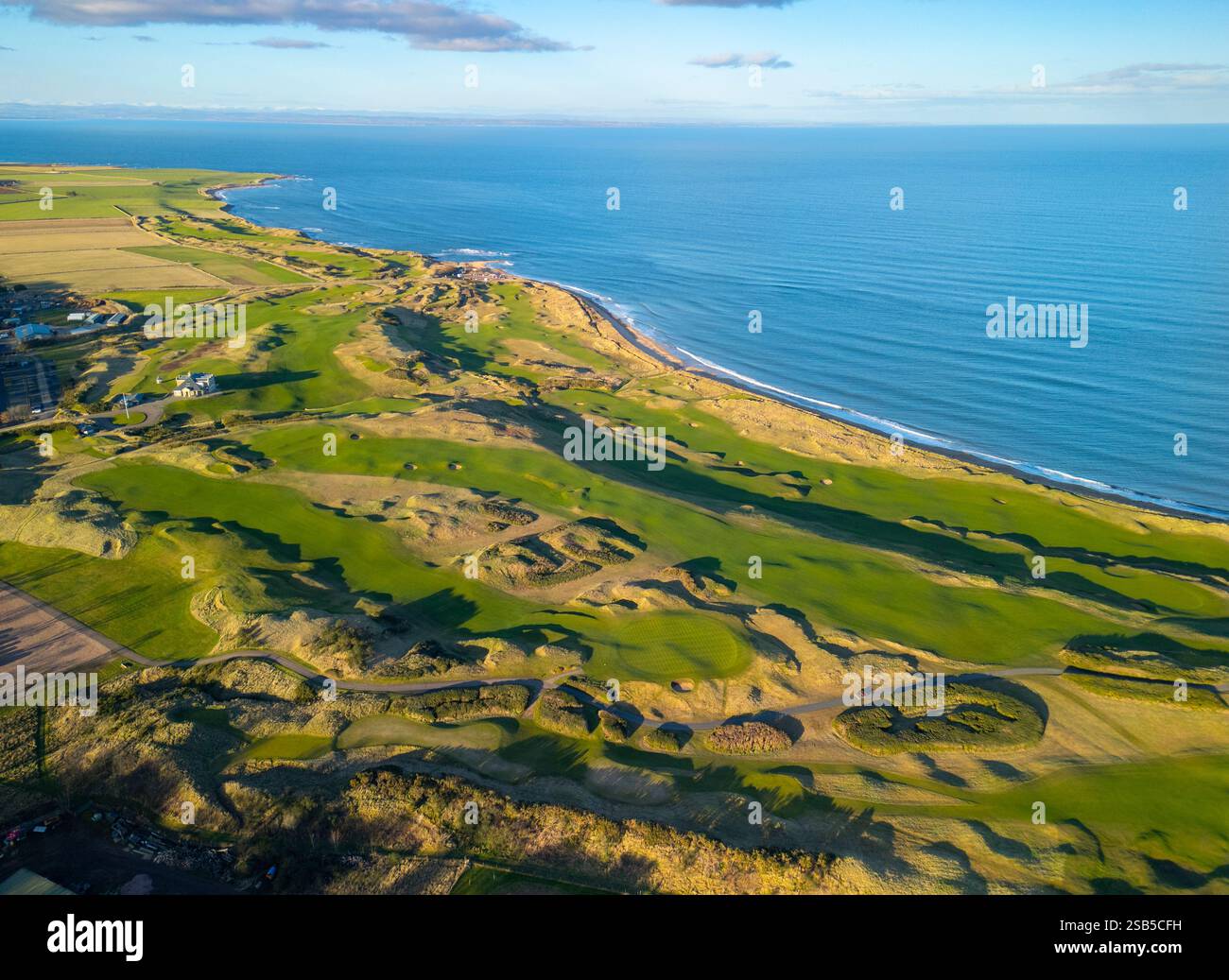 Aerial view of Kingsbarns Golf Course in winter light, Fife, Scotland ...