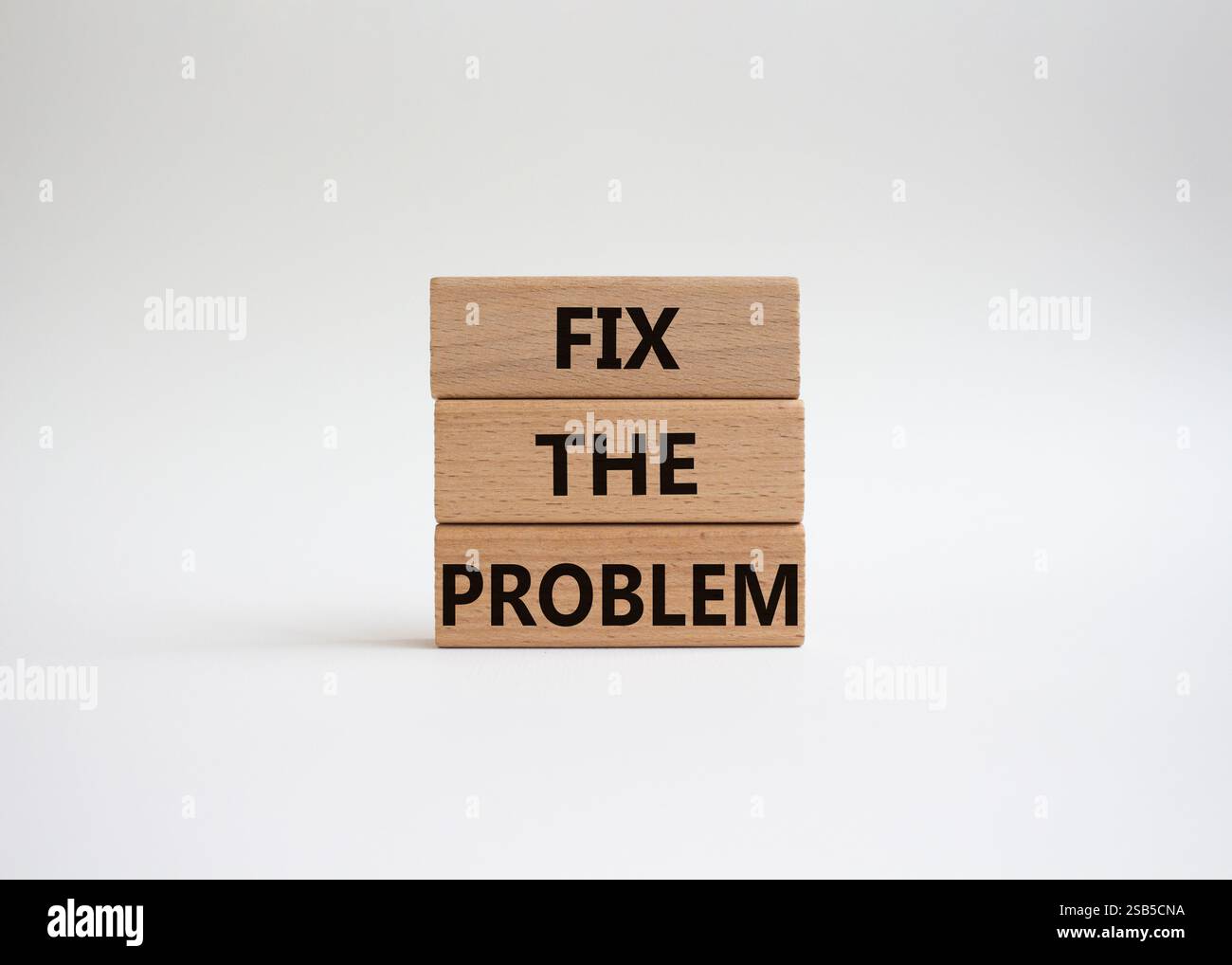 Fix the problem symbol. Wooden blocks with words Fix the problem ...